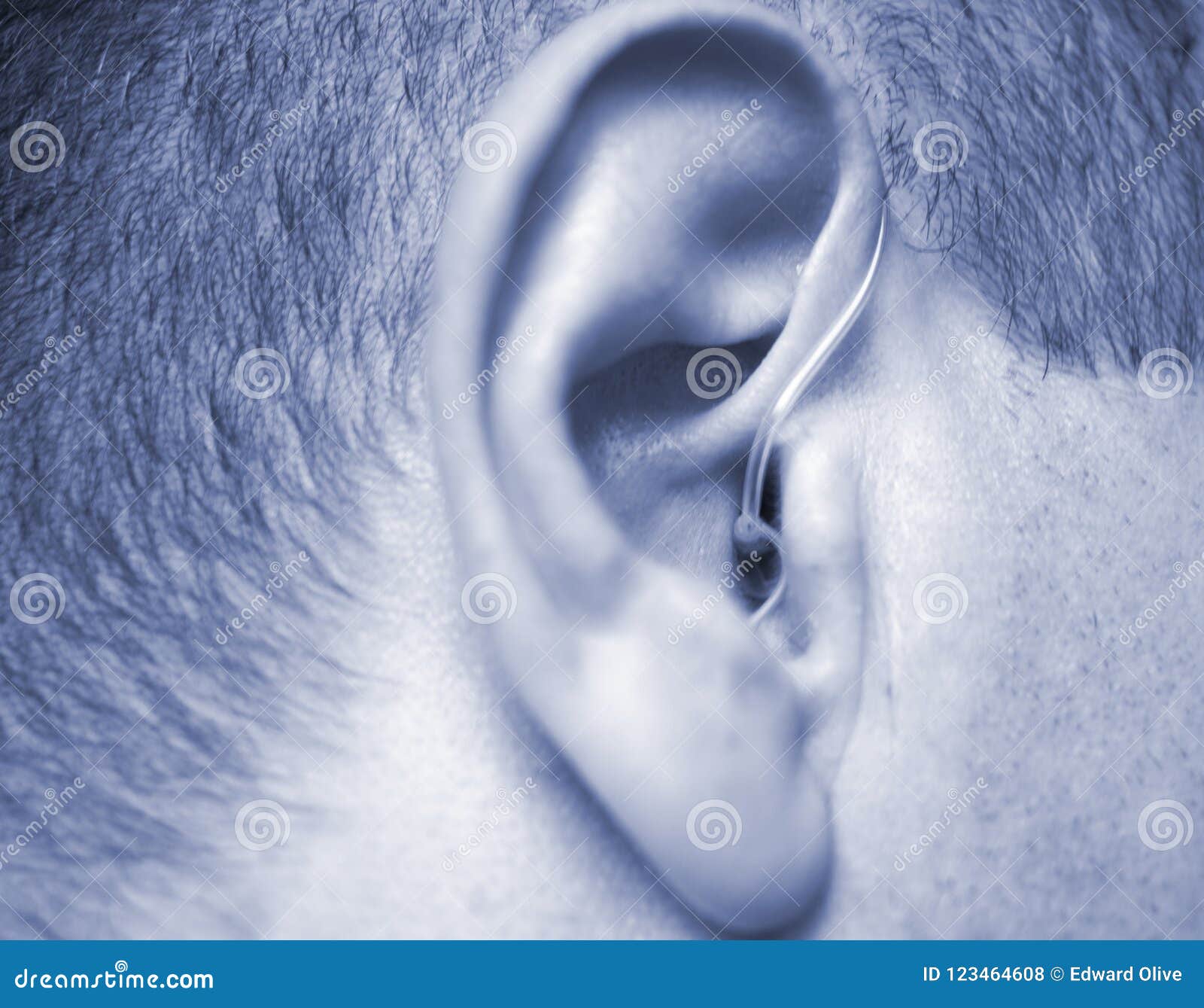 Hearing aid in ear of man stock photo. Image of advanced - 123464608