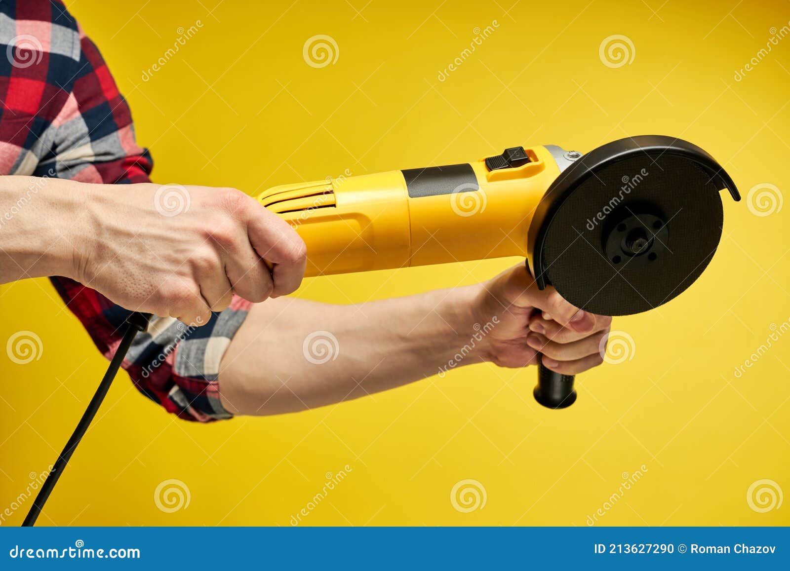 Modern, Compact Yellow Angle Grinder Isolated on Yellow Background ...