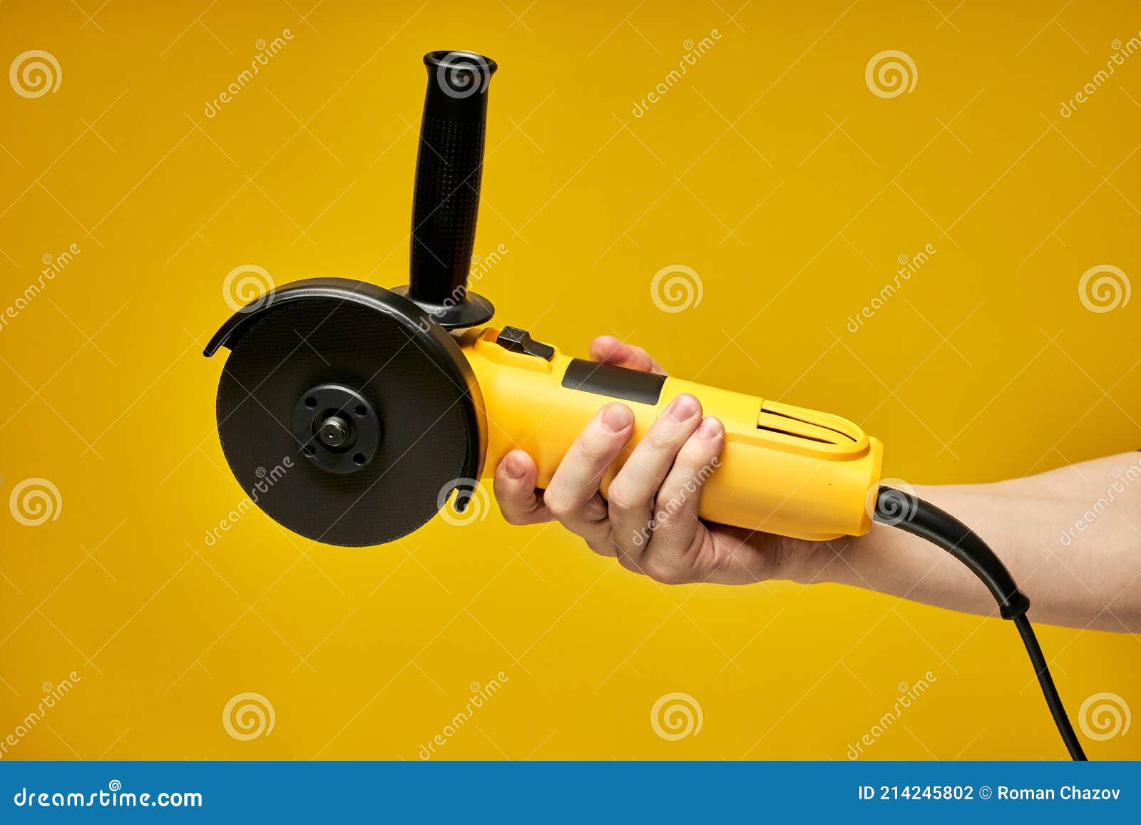 Modern, Compact Yellow Angle Grinder Isolated on Yellow Background ...