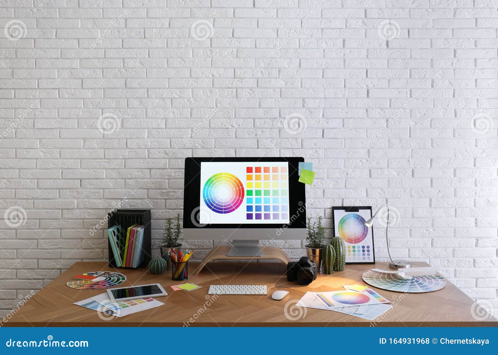 Modern Computer and Office Supplies on Table. Designer`s Workplace ...