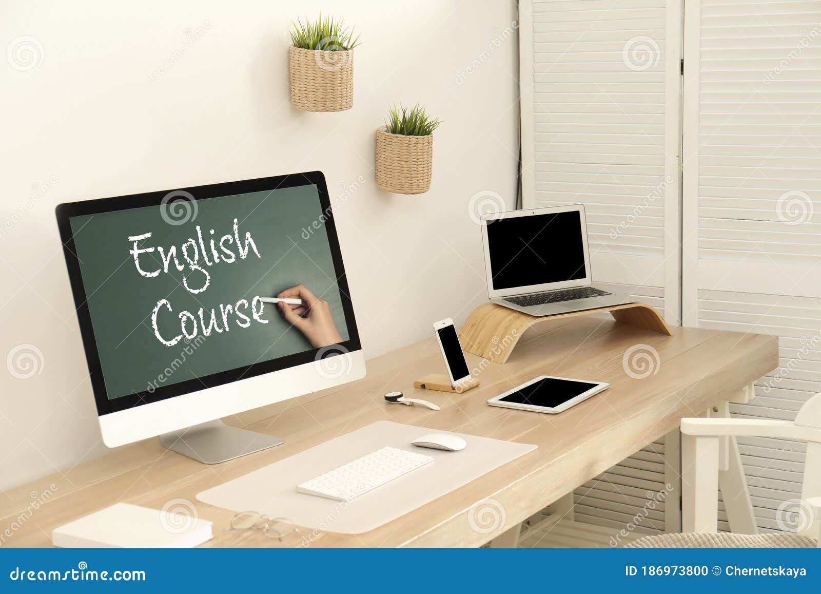 Computer for Online English Learning with Teacher on Table Indoors ...
