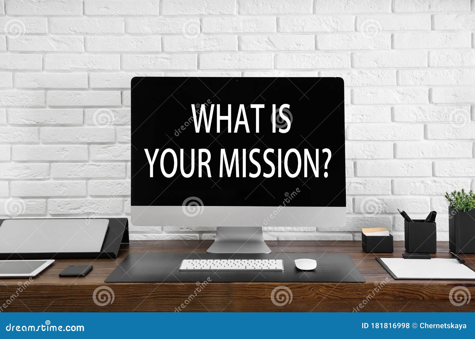Computer with Question WHAT is YOUR MISSION? on Screen Indoors Stock ...