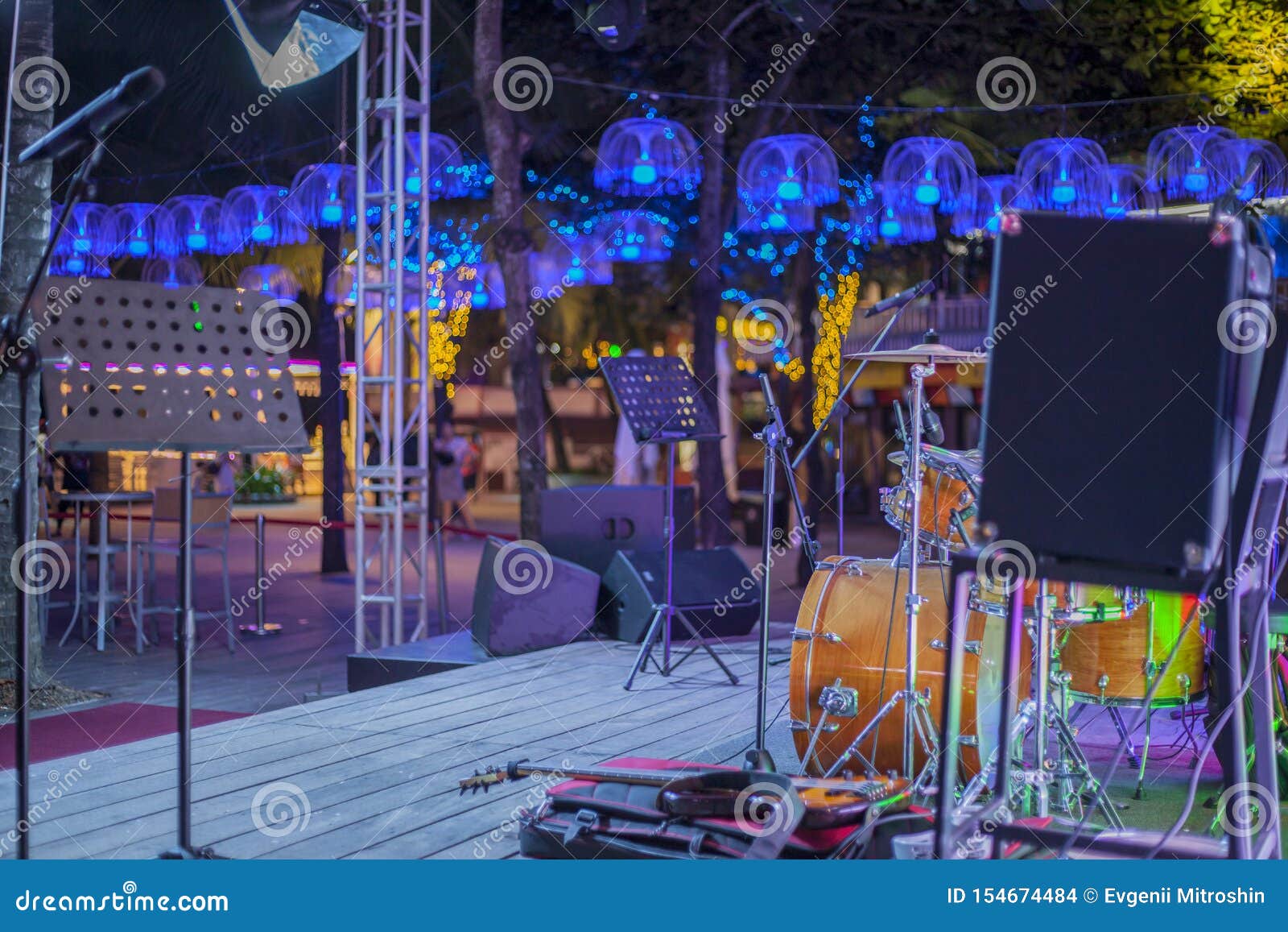 Modern Concert Stage with Musical Instruments, Bright Neon Lights Stock ...