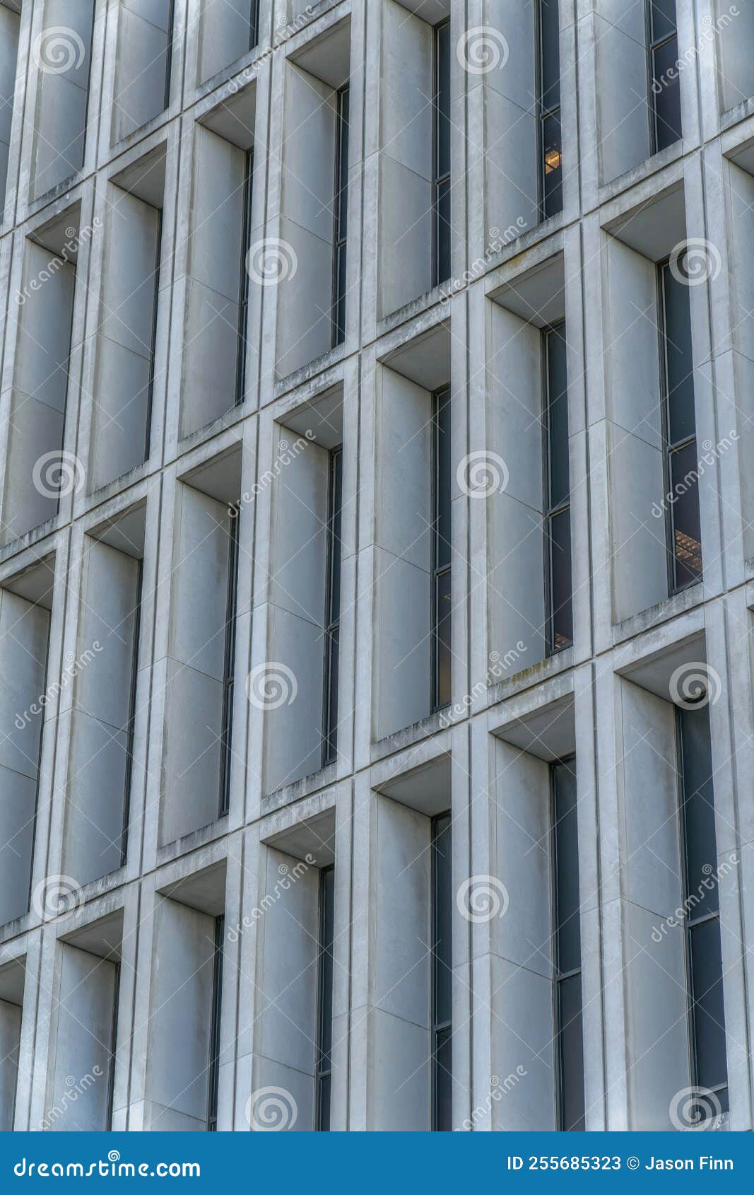 Modern Concrete Building in Austin Texas with Tall Rectangular Windows ...