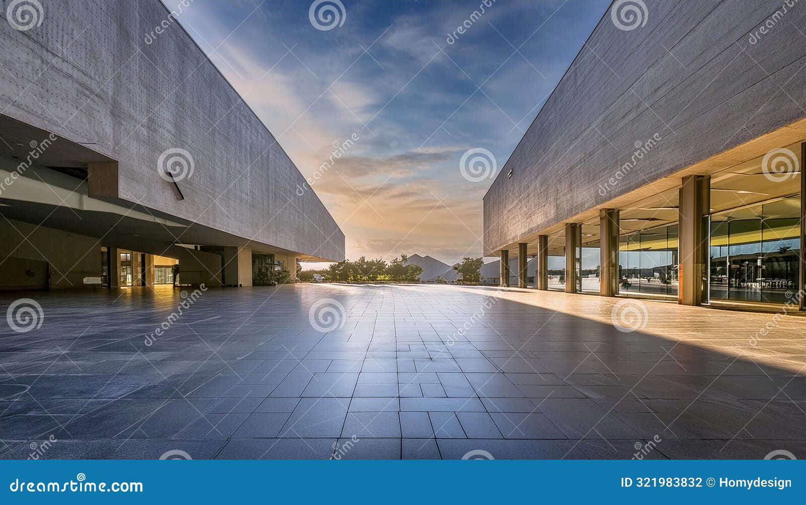 Modern Concrete Building with Large Windows and a Spacious Courtyard at ...