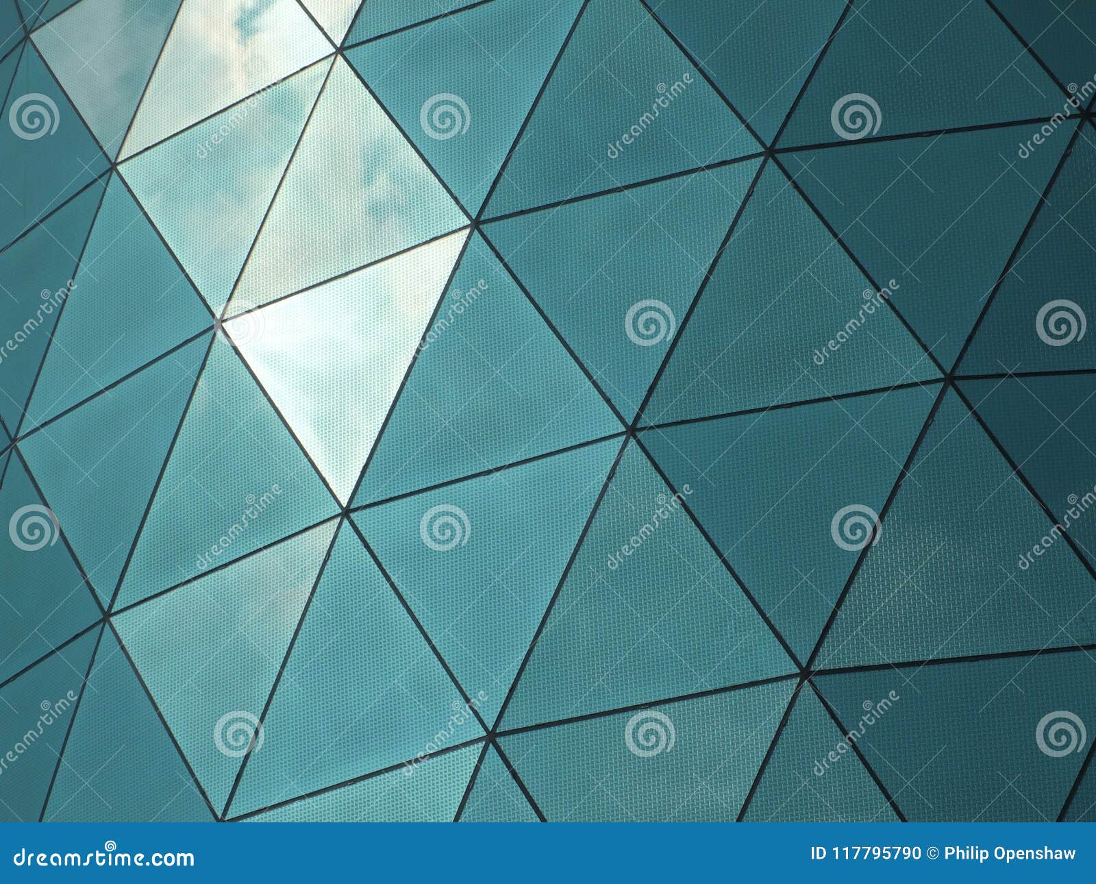 Modern Corporate Building with Angular Patterned Mirrored Windows Panes ...