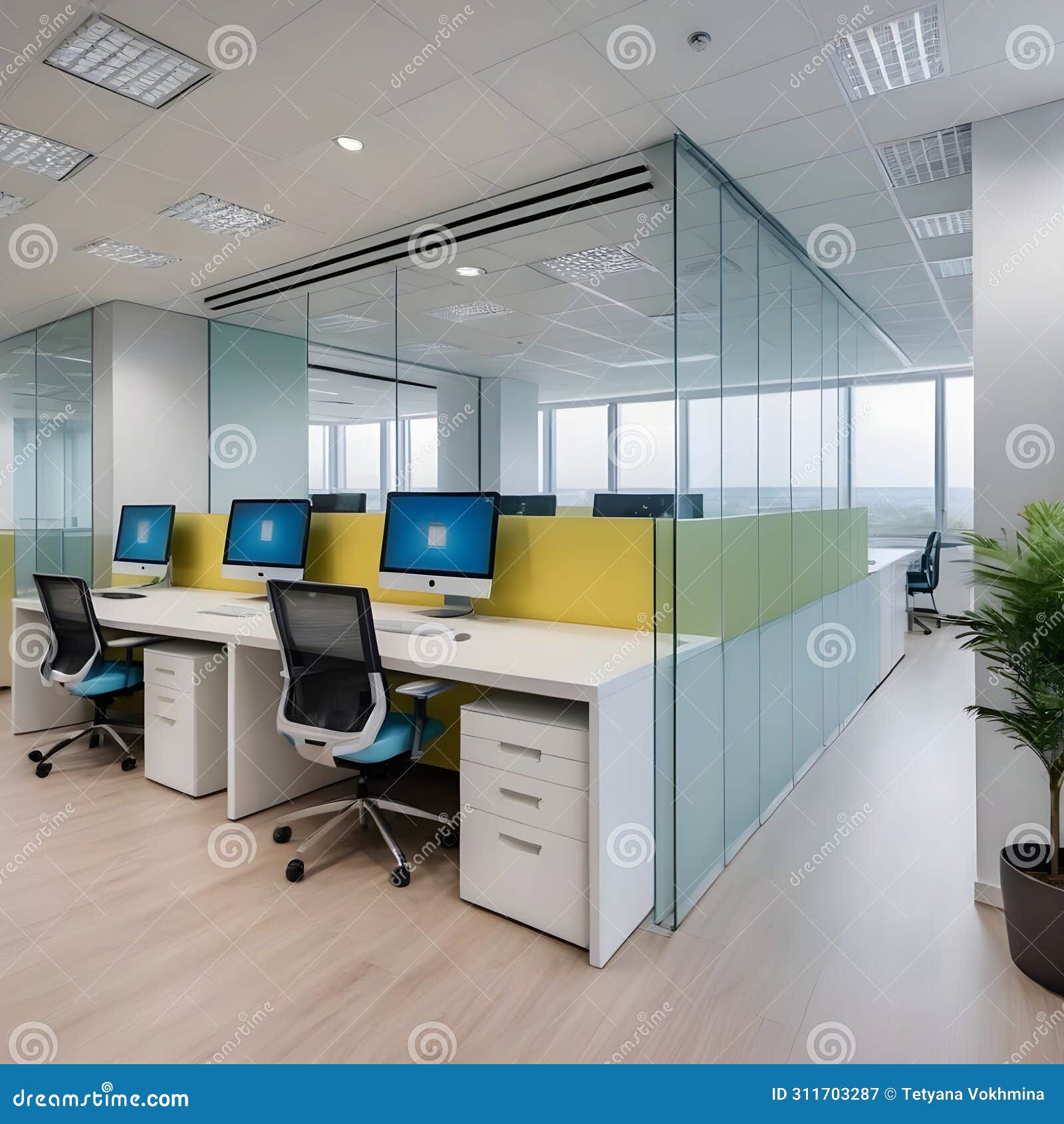 Modern Corporate Office Space with Desks and Computers during Daylight ...