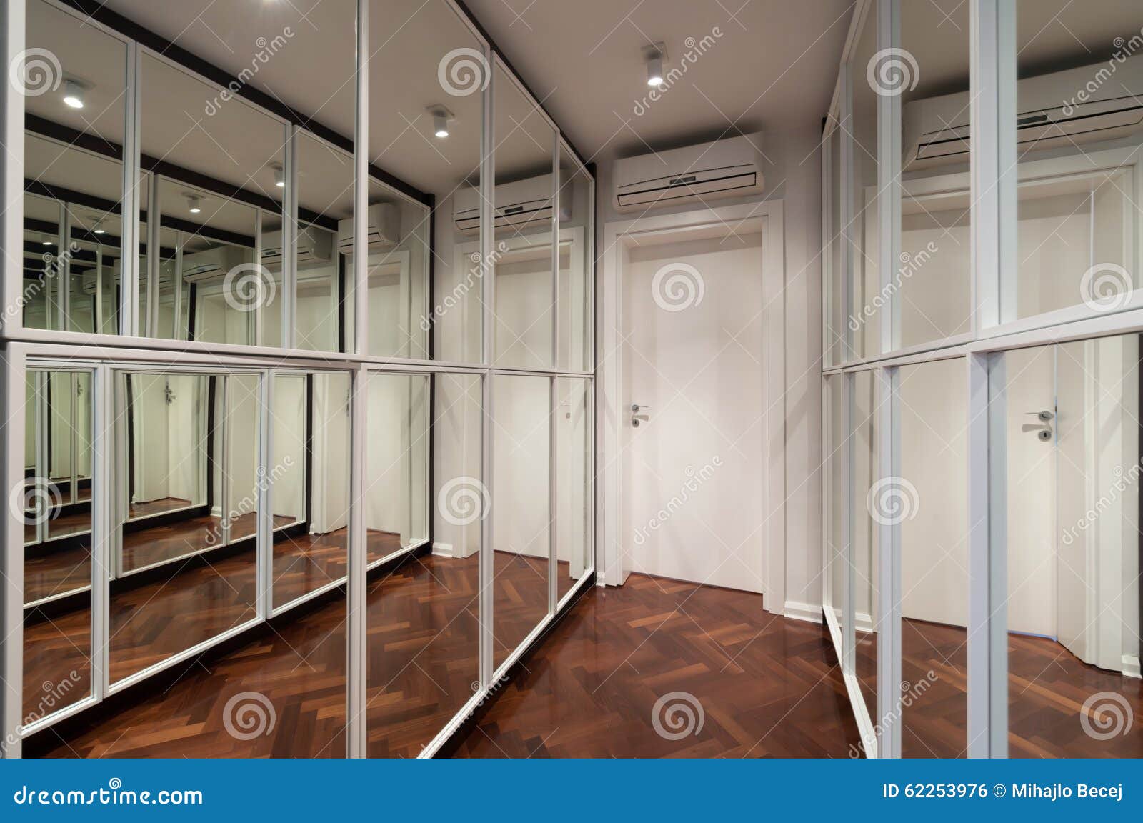 Modern Corridor Interior with Mirror Wardrobe Doors Stock Photo - Image ...
