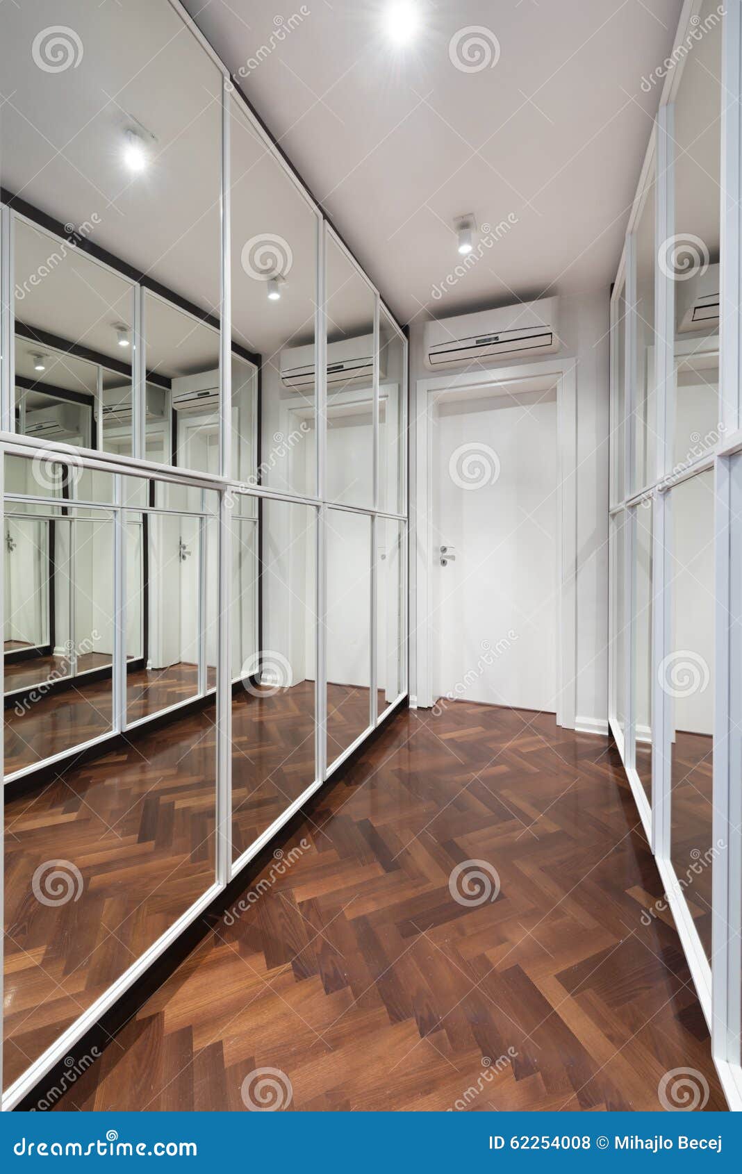 Modern Corridor Interior with Mirror Wardrobe Doors Stock Photo - Image ...