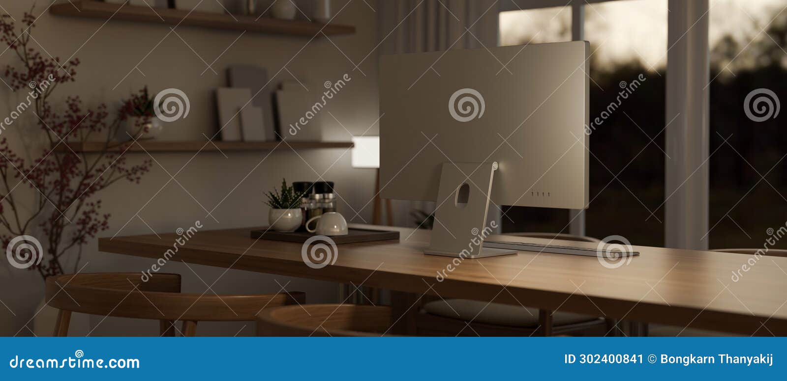 A Modern, Cosy Office Workspace in the Evening with a Computer on a ...
