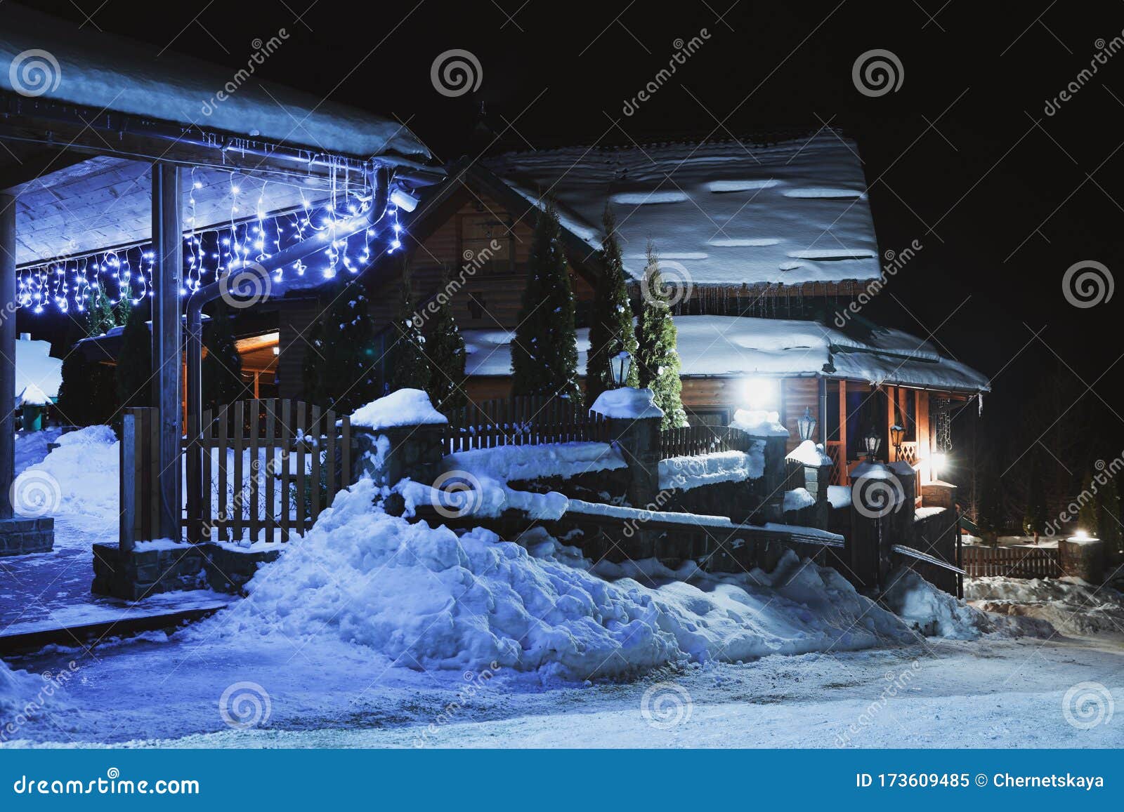 Modern Cottage Covered with Snow at Night. Winter Vacation Stock Image ...