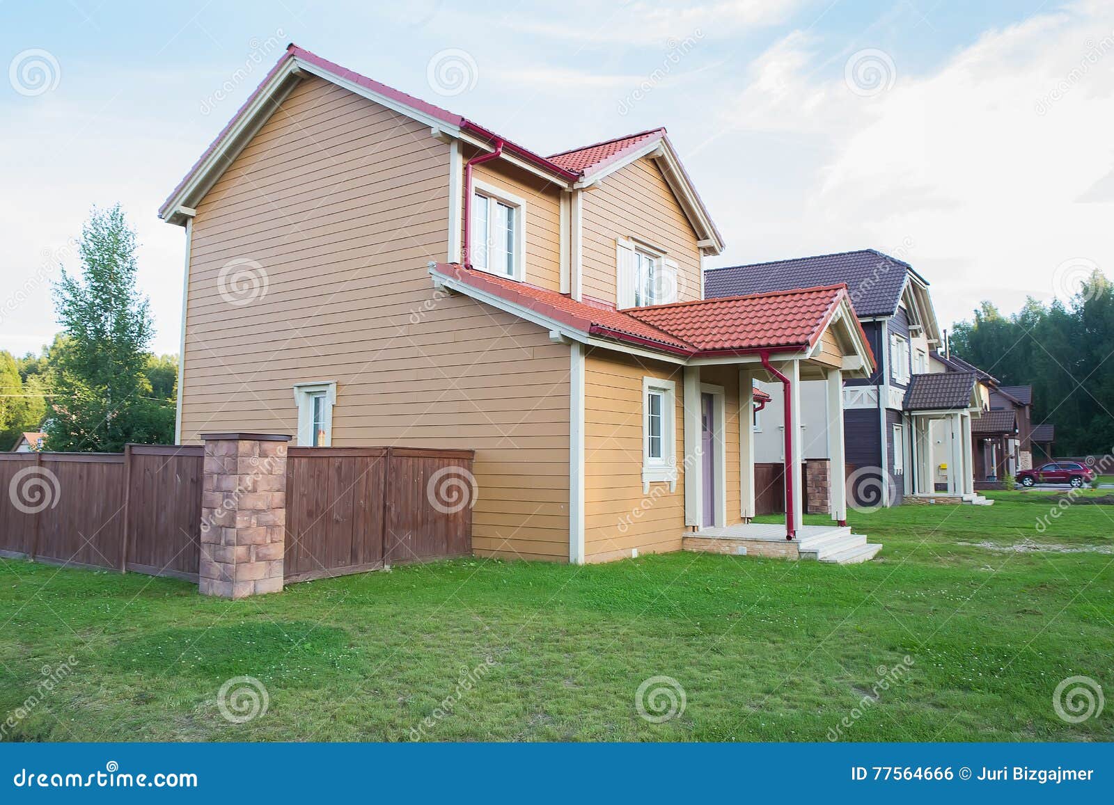 Modern cottage on sunset stock photo. Image of deck, district - 77564666