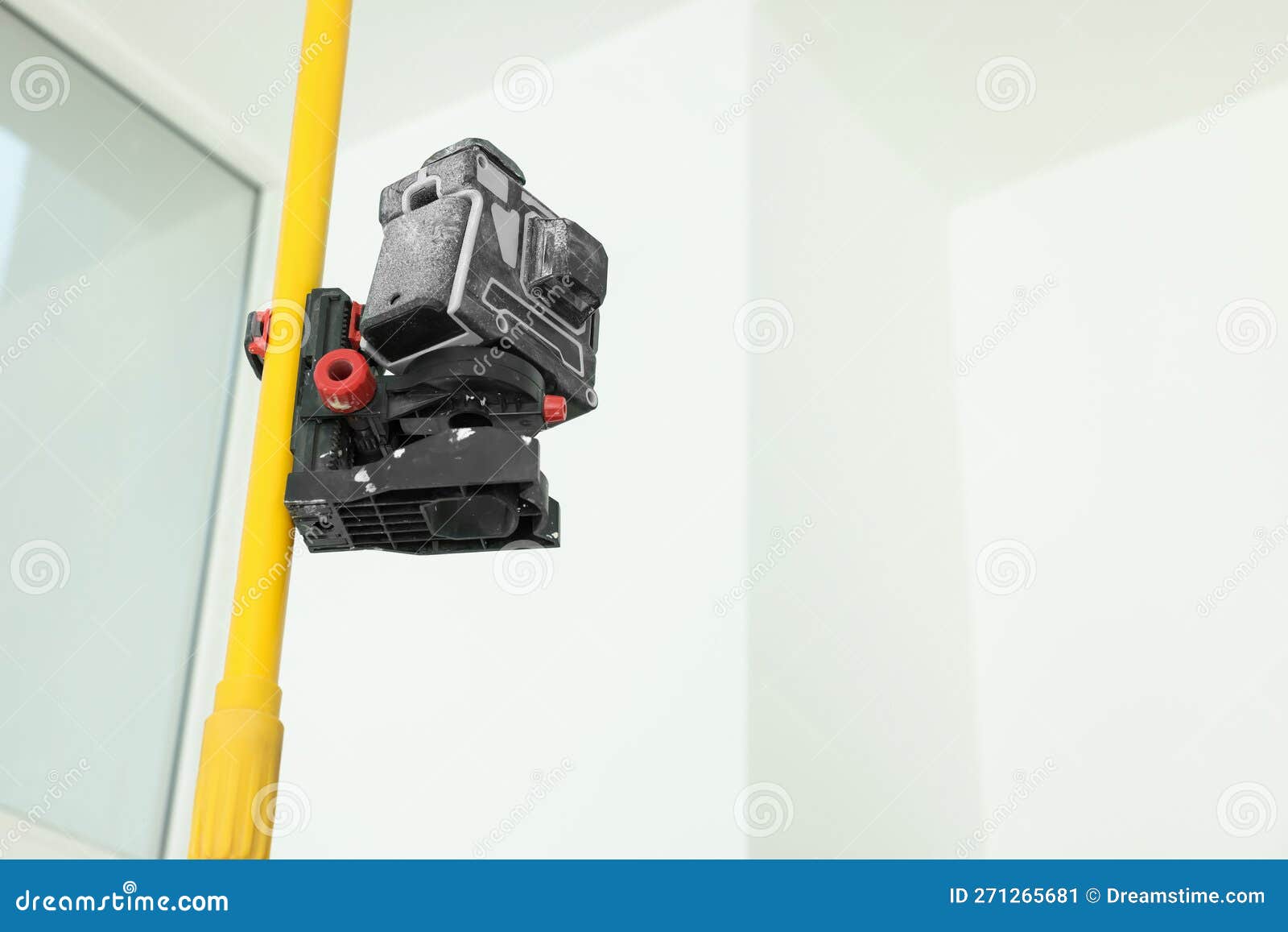 Modern Cross Line Laser Level Indoors, Space for Text. Tiles ...