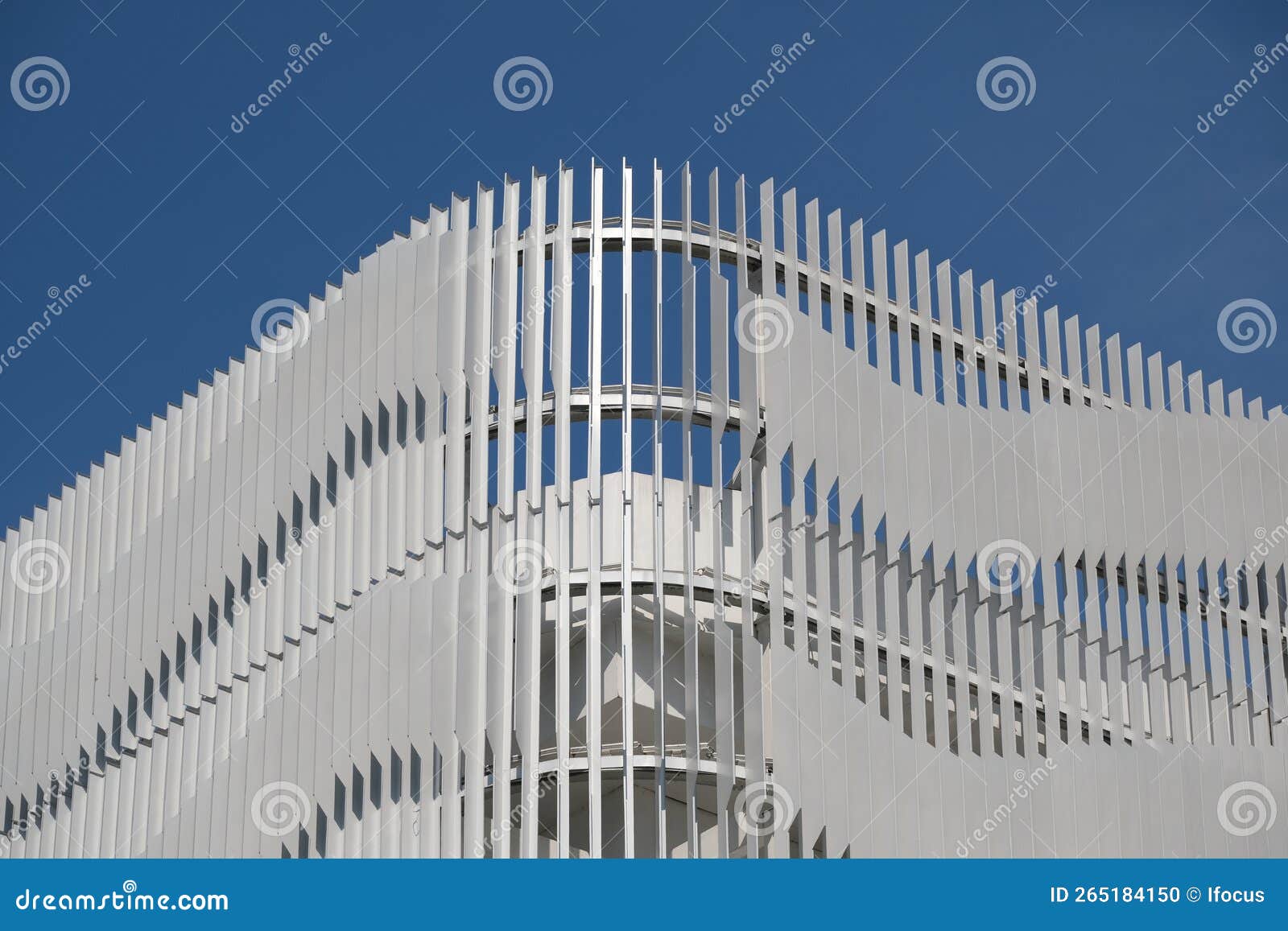 Modern Curved Building Facade Against Blue Sky Stock Photo - Image of ...