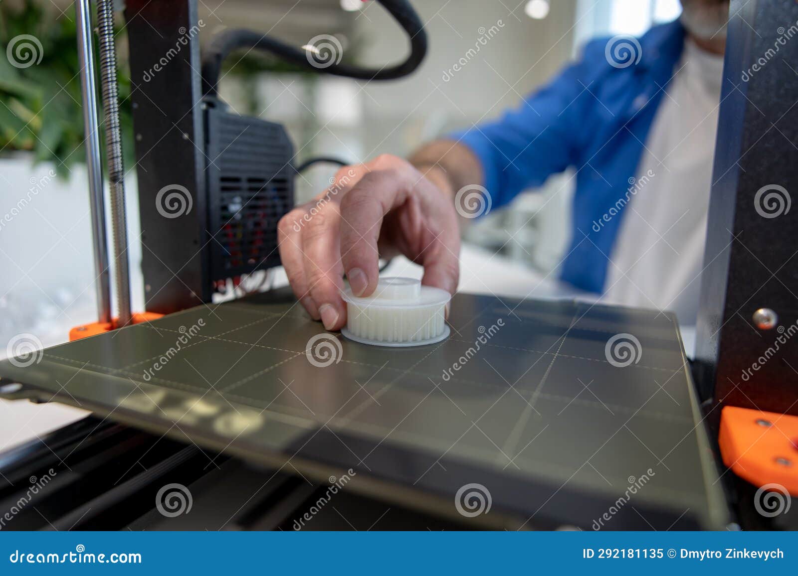 Modern 3D Printer Equipment and Man Working with it in Office. Stock ...