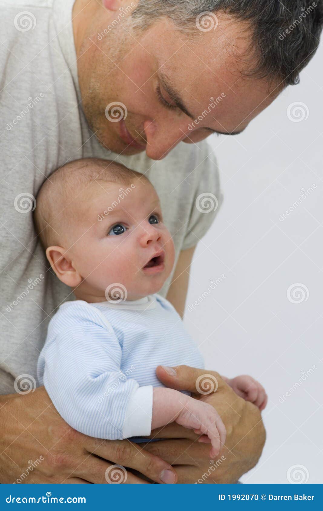 Modern Dad stock photo. Image of secure, fatherhood, newborn - 1992070