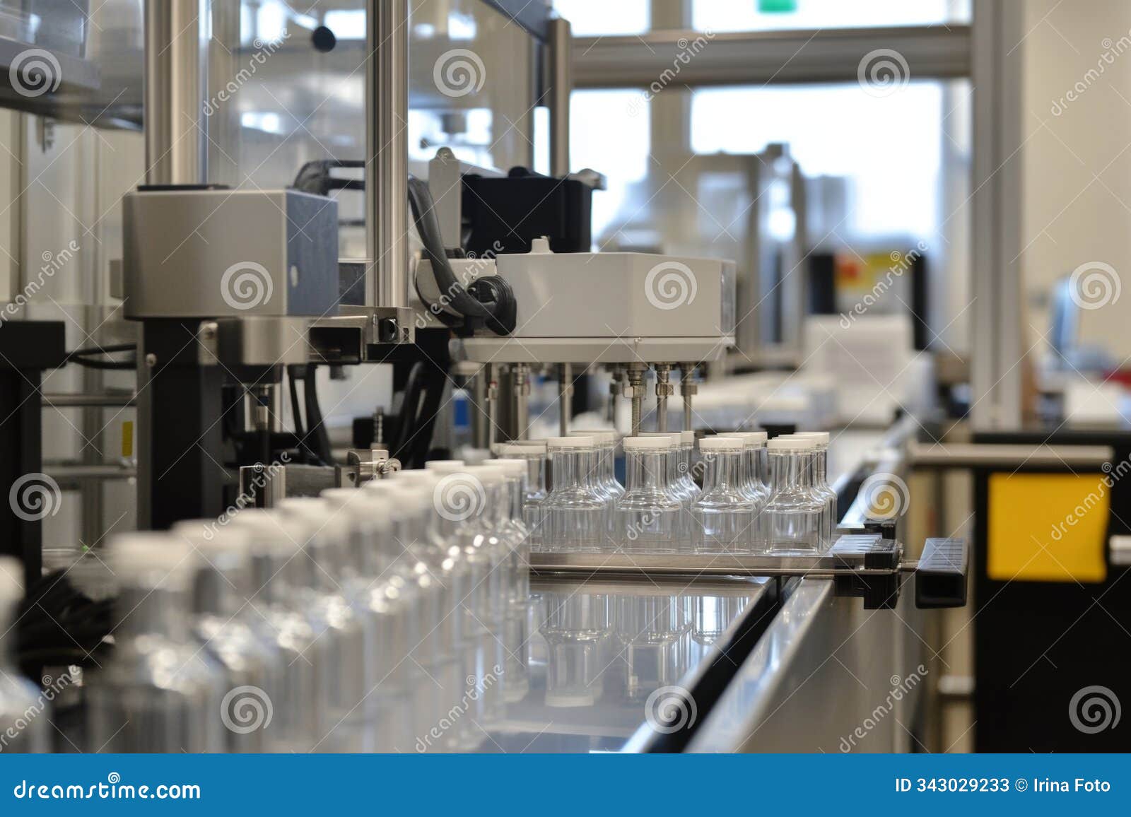 A Modern Dairy Production Line Showcases Efficient Bottling on a ...