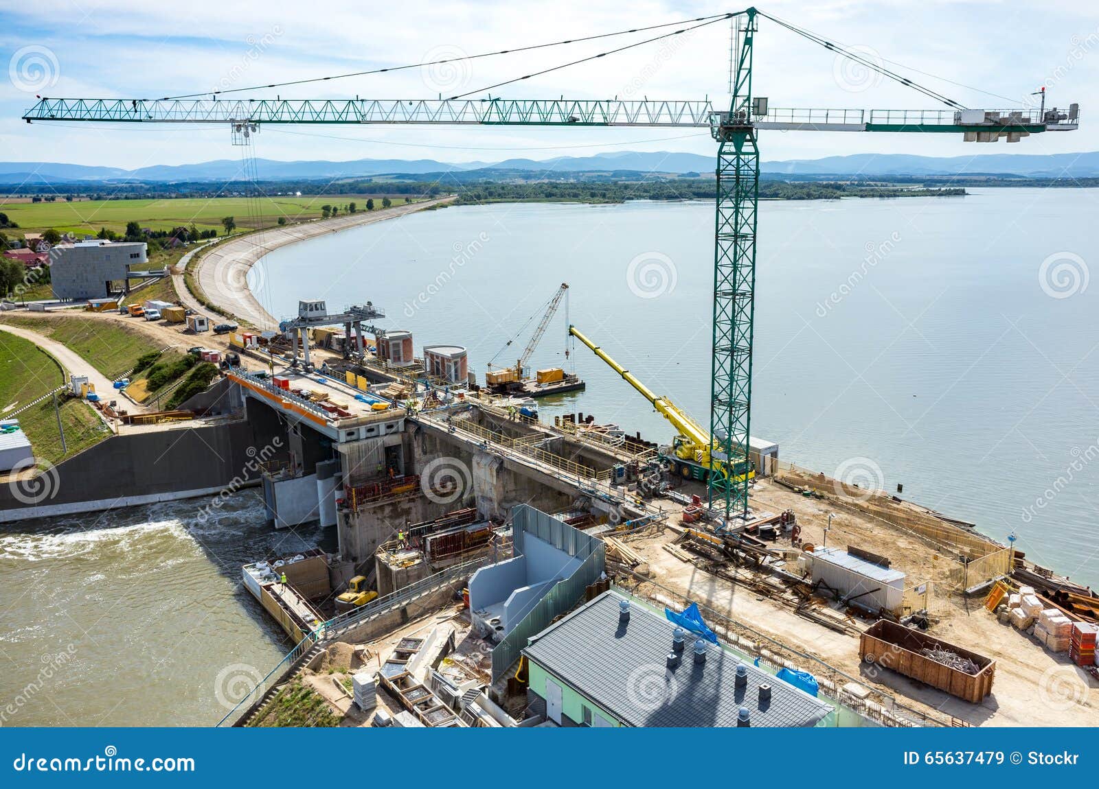 Modern dam reconstruction stock image. Image of crane - 65637479