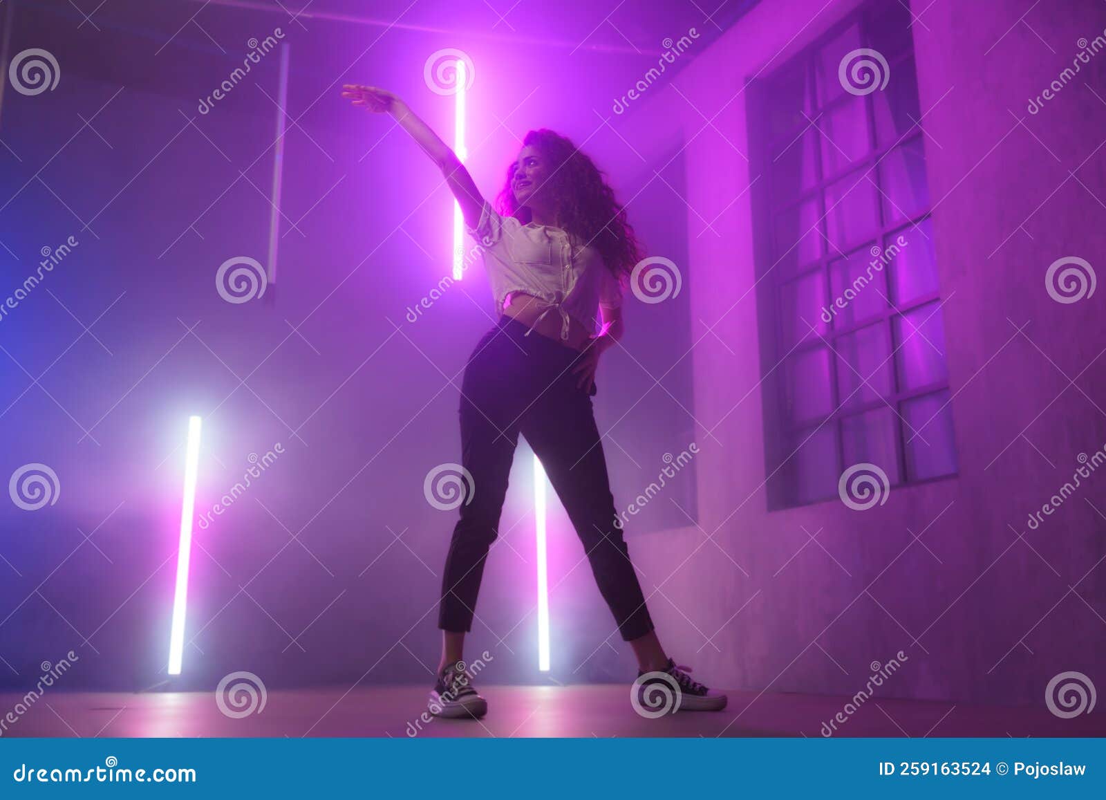 Modern Dance Girl Dancer Dancing in Neon Light Doing Gymnastic ...