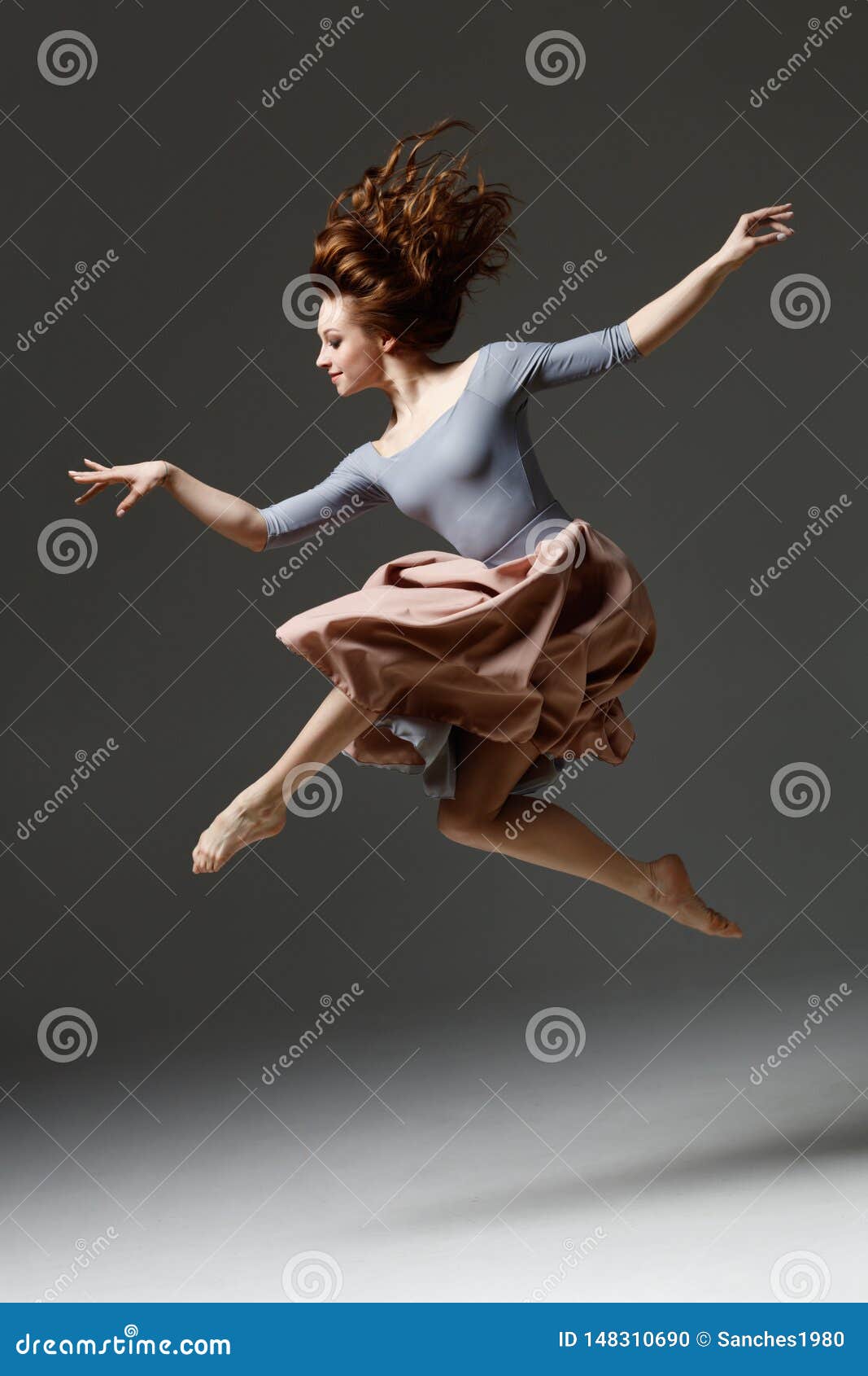 The Modern Dancer Jumping on a Gray Background Stock Photo - Image of ...