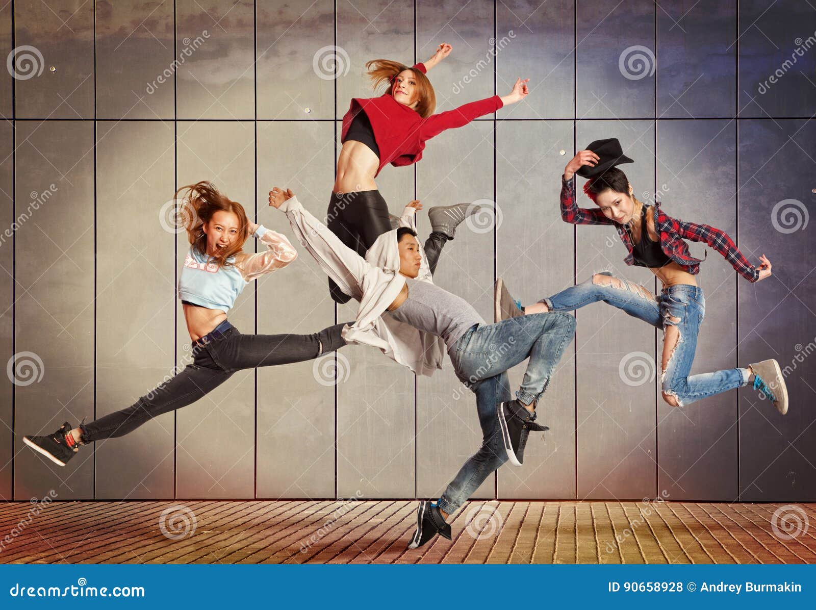 Modern Dancing Group Practice Dancing in Front Wall Stock Photo - Image ...
