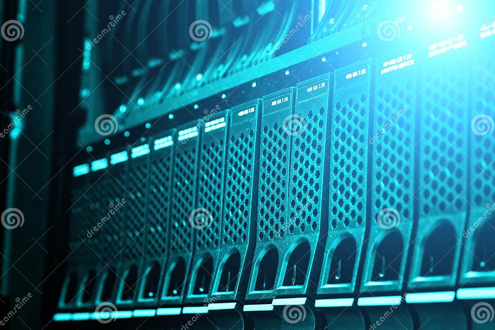 Modern Data Center Disk Storage Perspective Closeup with Blue Light ...