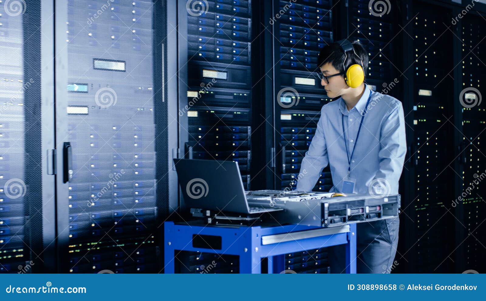 In the Modern Data Center: it Engineer Doing Maintenance and ...