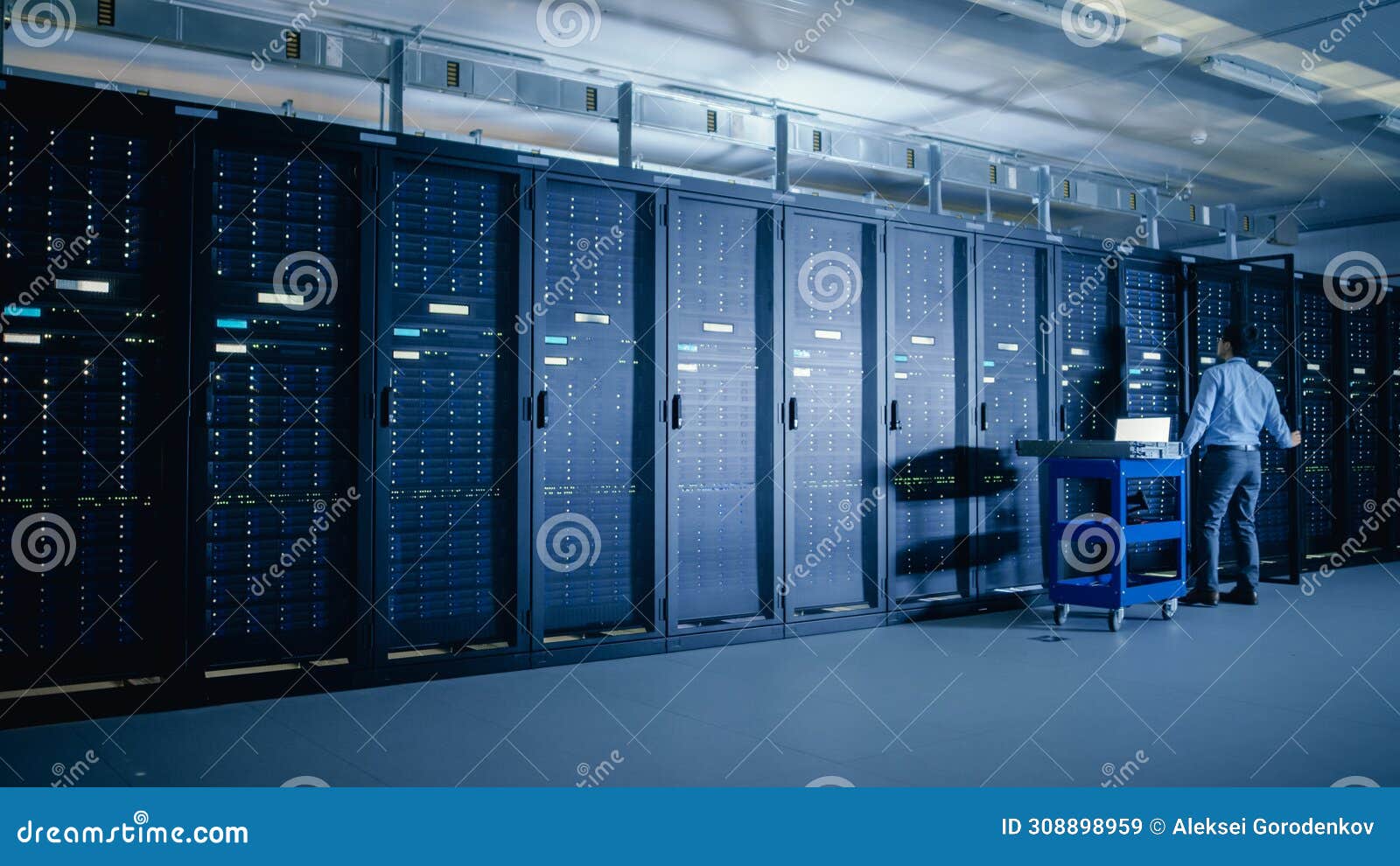 In the Modern Data Center: it Engineer Doing Maintenance and ...