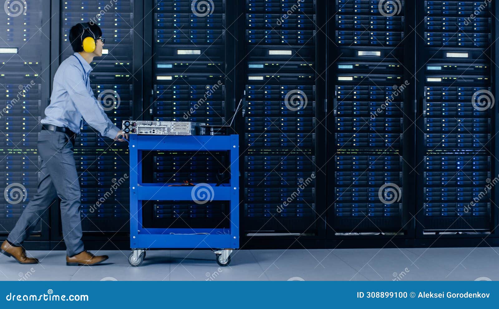 In the Modern Data Center: it Engineer Doing Maintenance and ...