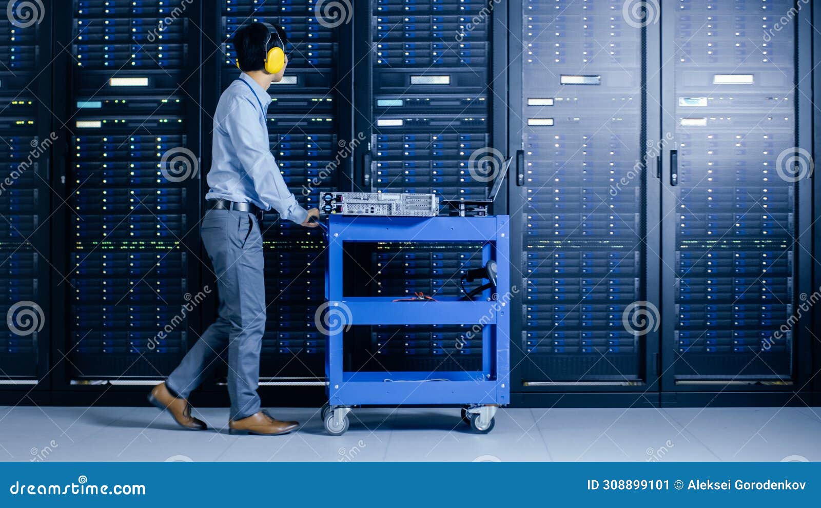 In the Modern Data Center: it Engineer Doing Maintenance and ...