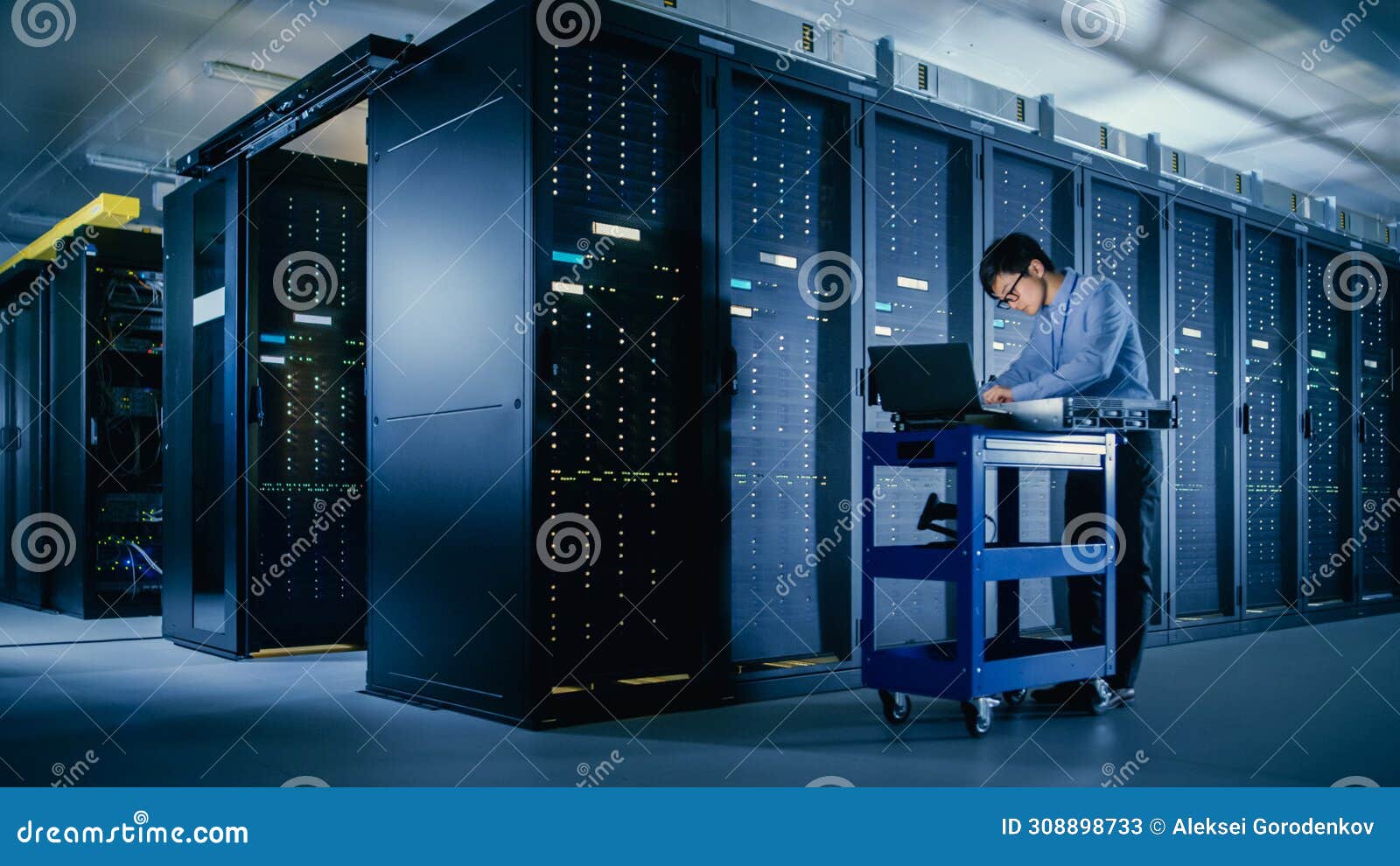 In the Modern Data Center: it Engineer Doing Maintenance and ...