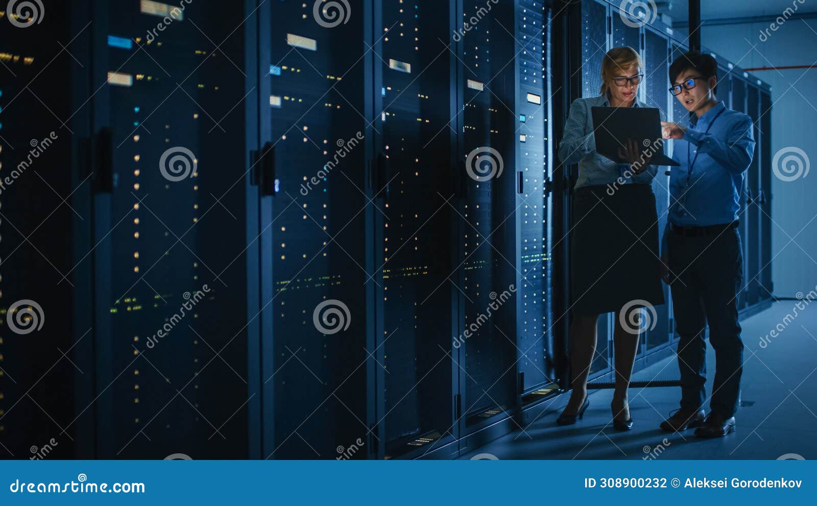 In the Modern Data Center: Engineer and it Specialist Work with Server ...
