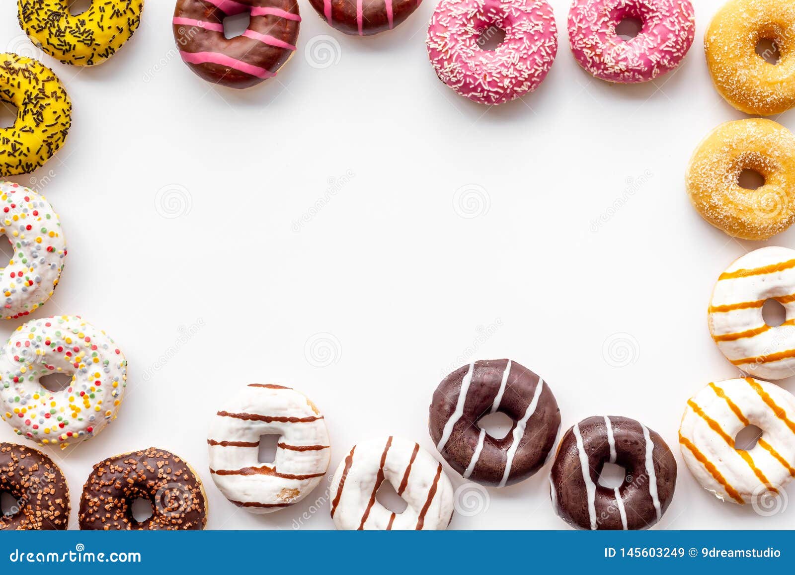 Modern Design with Bright Donuts Frame on White Background Top View ...