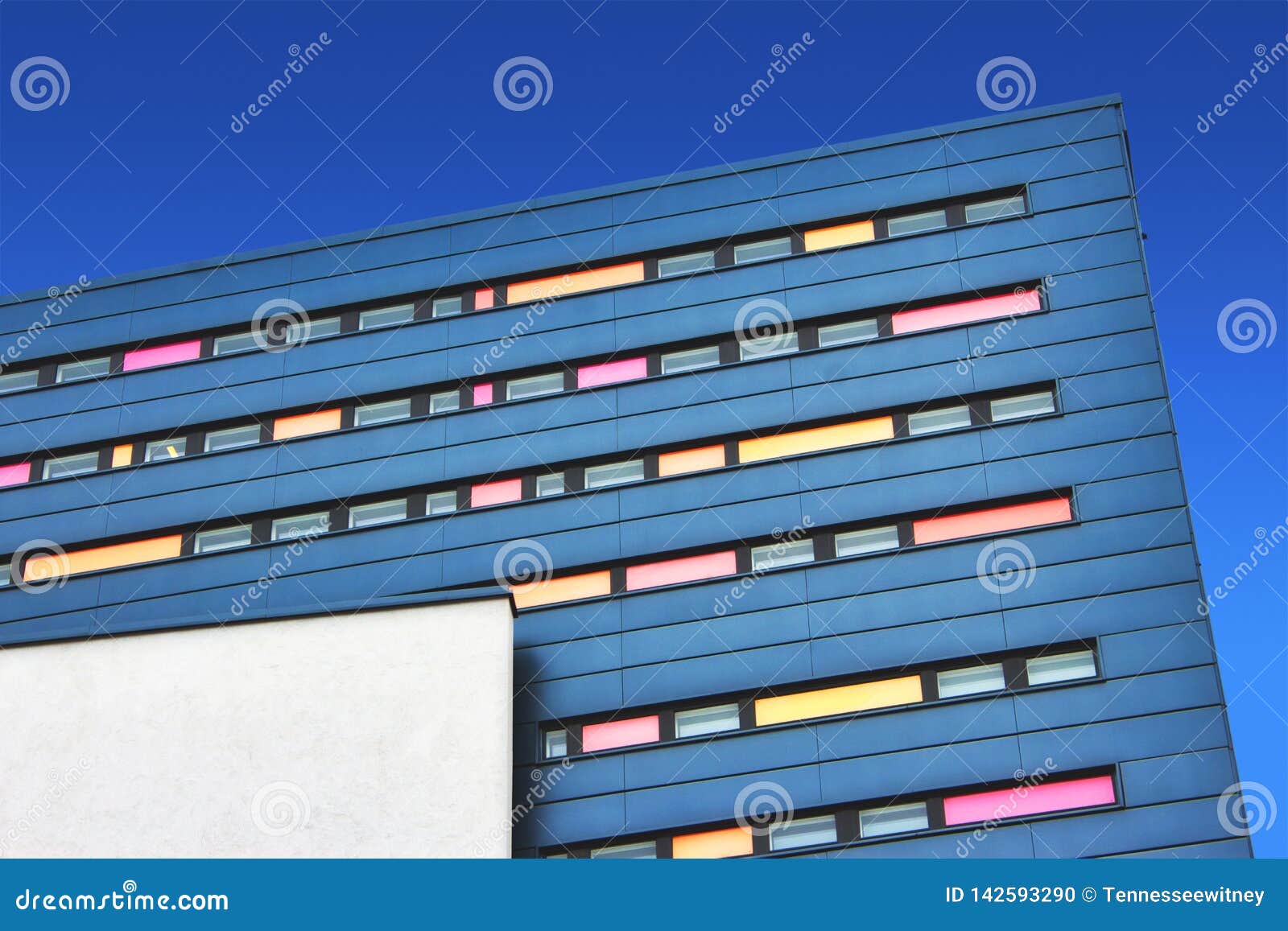 Modern Design Office Block with Colorful Facade Against a Blue Sky ...