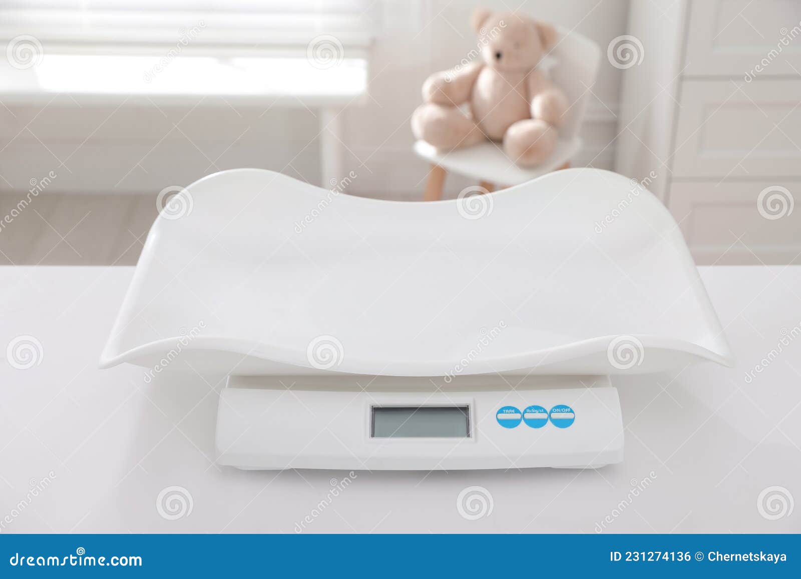 Modern Digital Baby Scales on Table in Room Stock Photo - Image of ...
