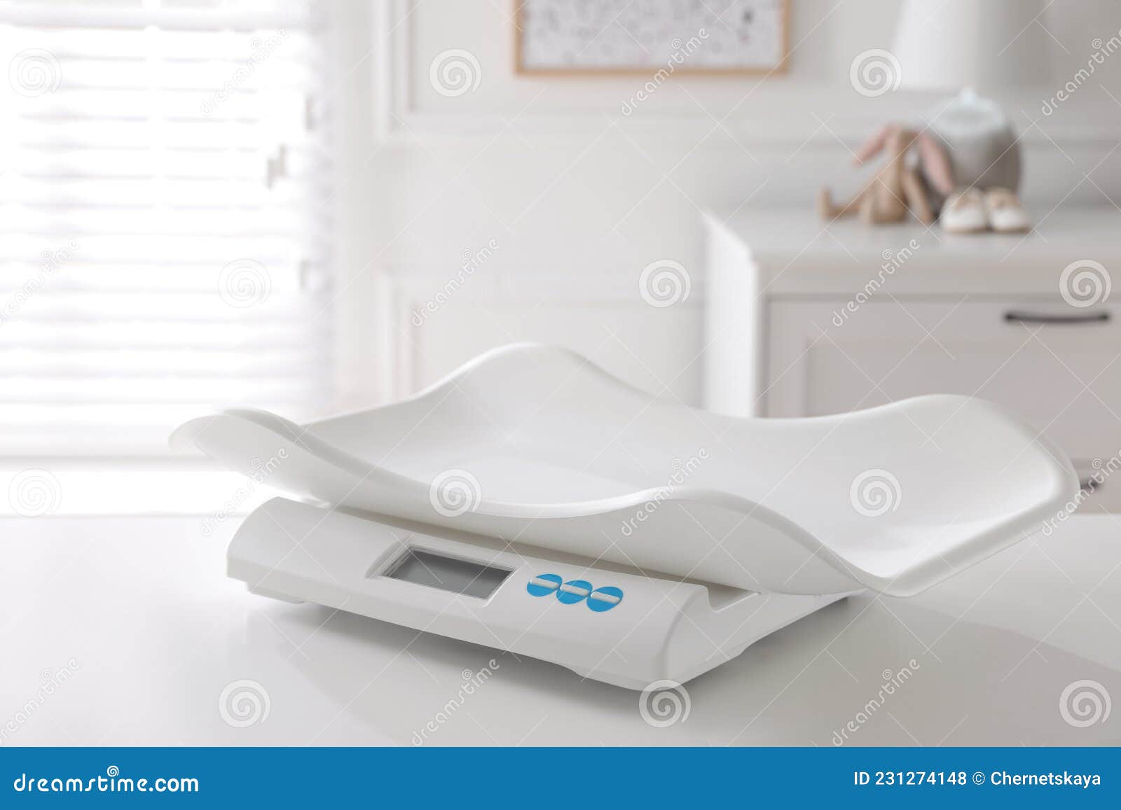 Modern Digital Baby Scales on Table in Room Stock Photo - Image of ...
