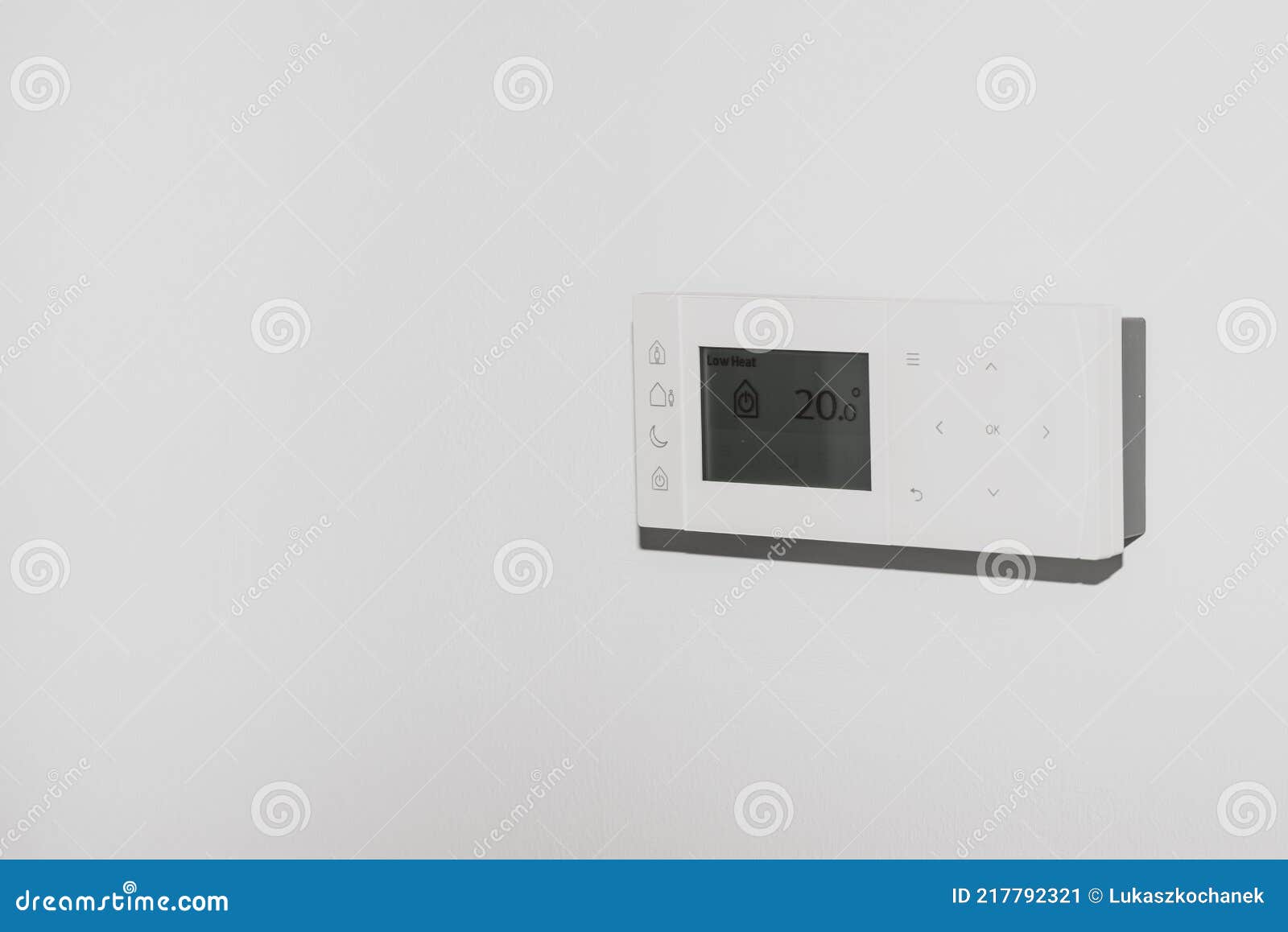 Modern Digital Programmable Thermostat on a Wall Stock Image - Image of ...