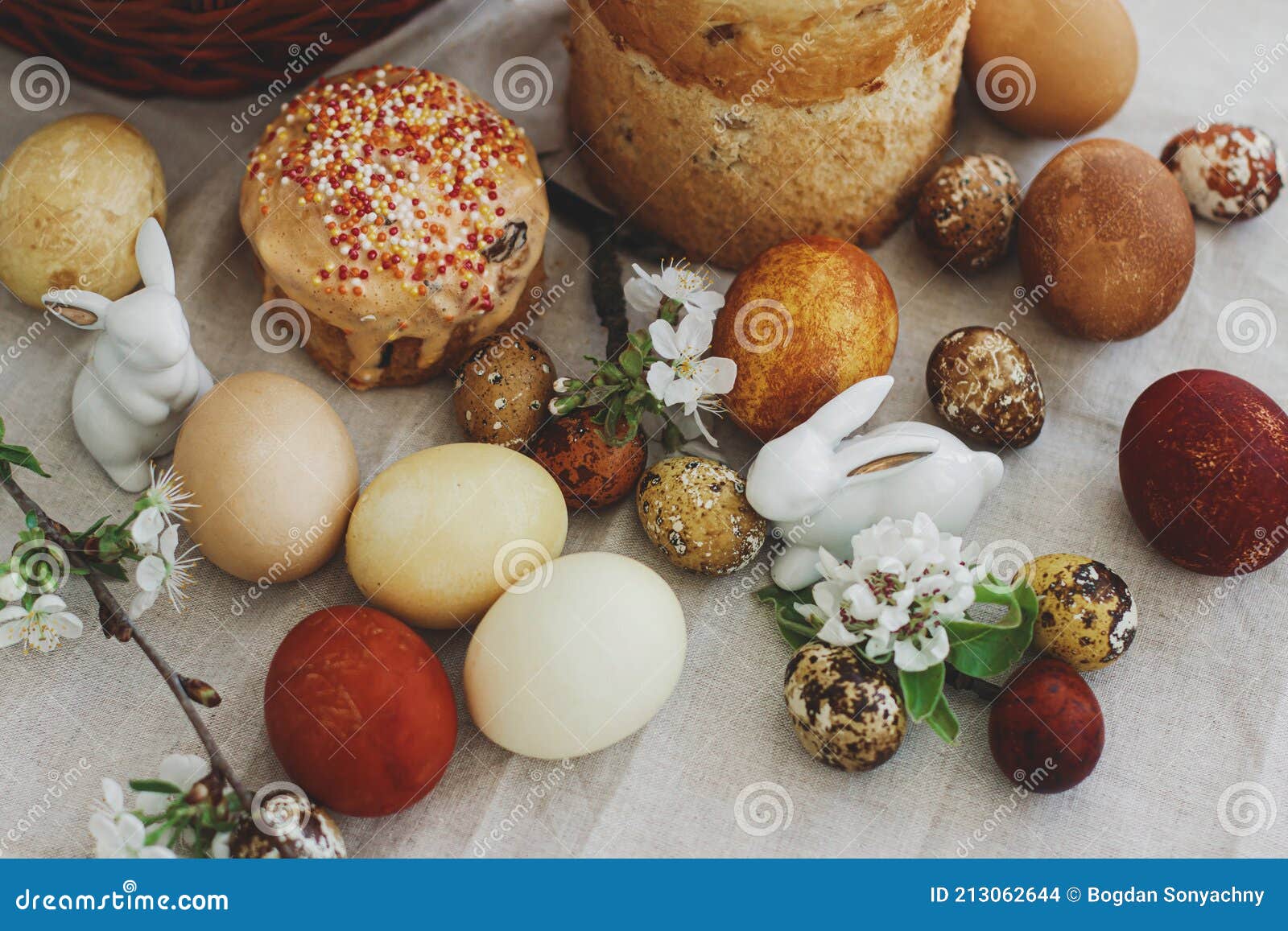 Modern Easter Eggs, Easter Bread, Basket, Bunny and Spring Flowers on ...