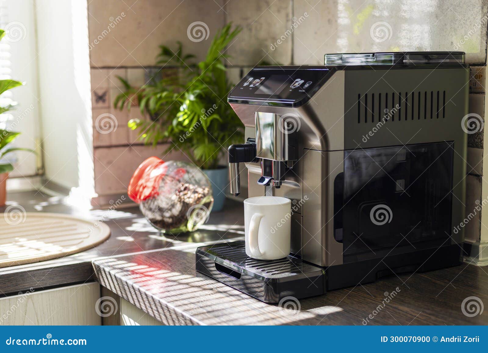 Modern Electric Coffee Machine with Cup on Countertop in Kitchen Stock ...
