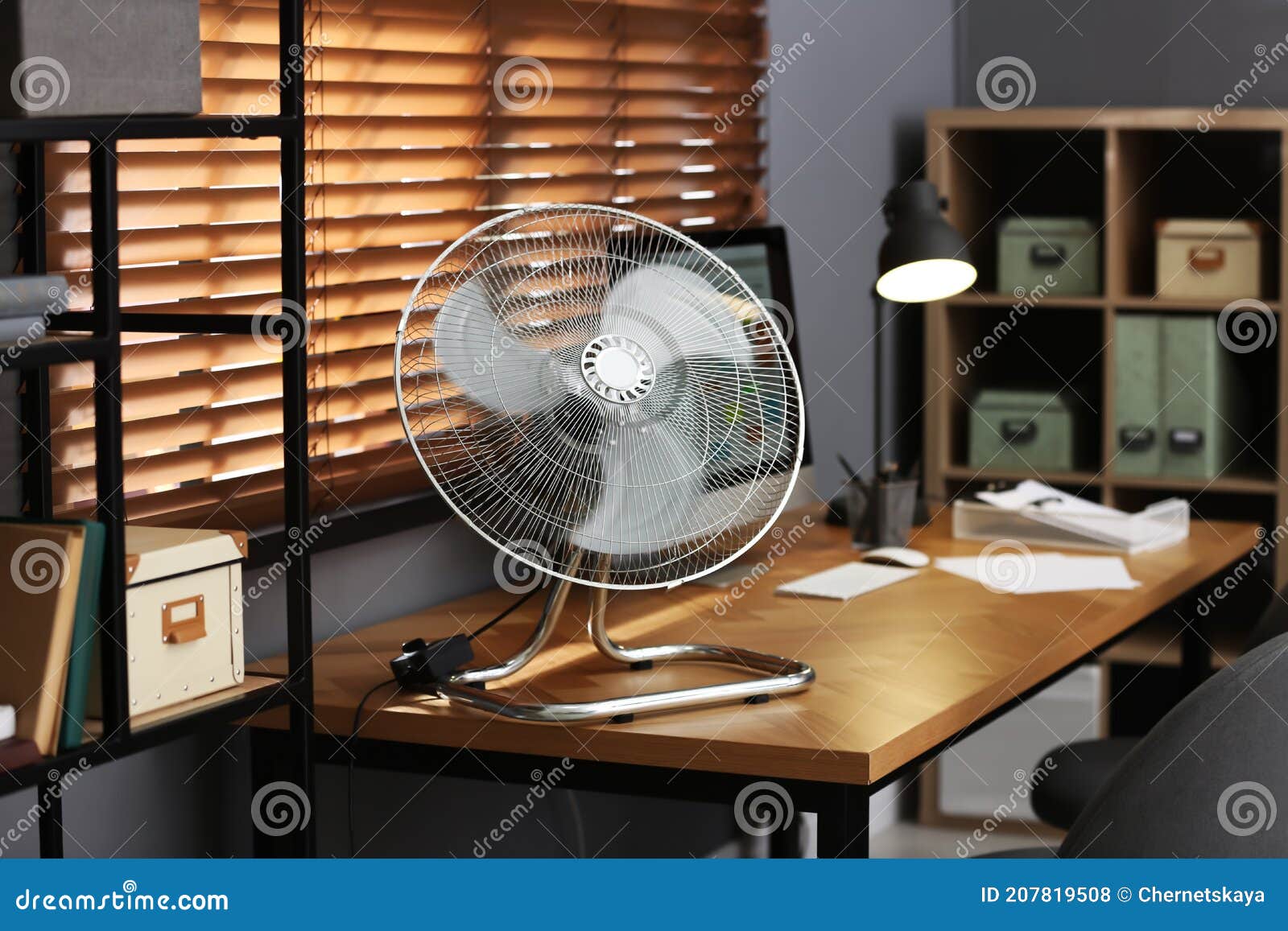 Modern Electric Fan on Table in Office Stock Photo - Image of office ...