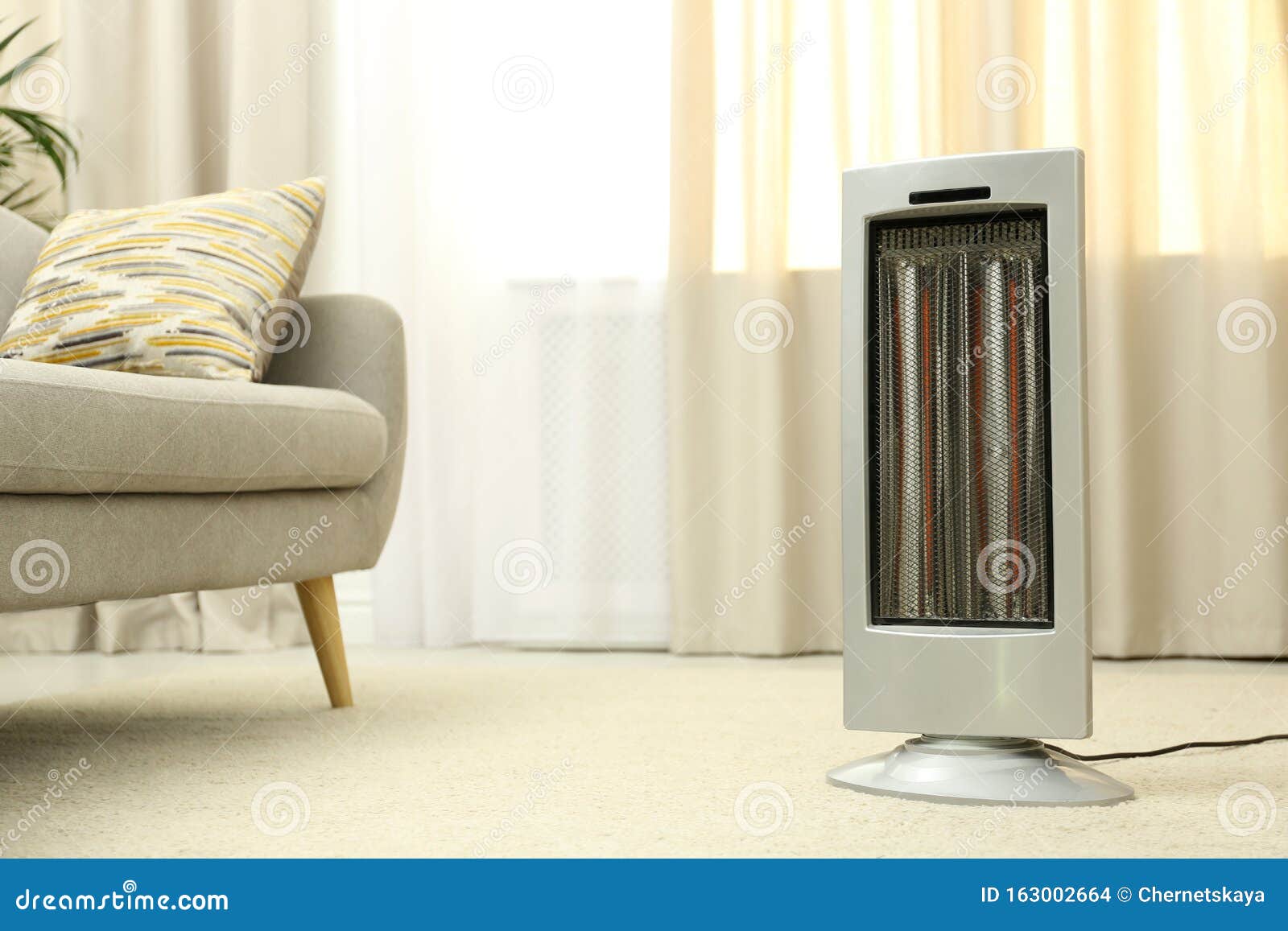Modern Electric Infrared Heater on Floor . Space for Text Stock Photo ...