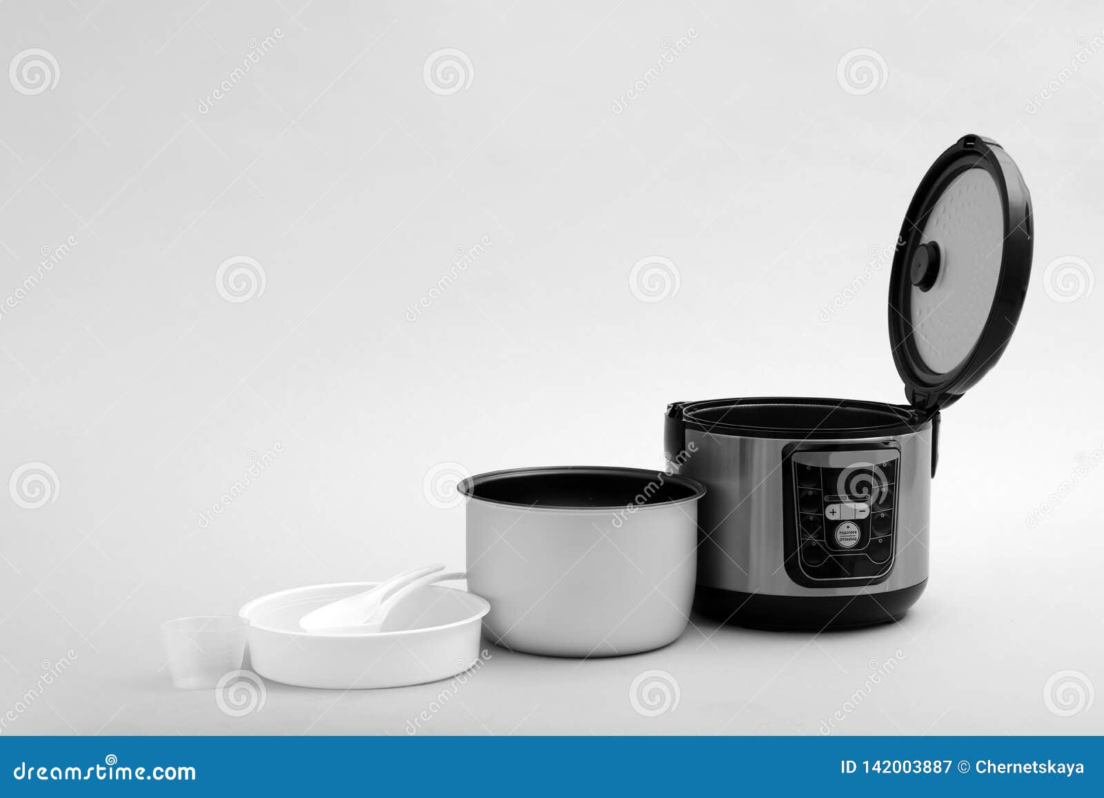 Modern Electric Multi Cooker, Parts and Accessories on Grey Background ...