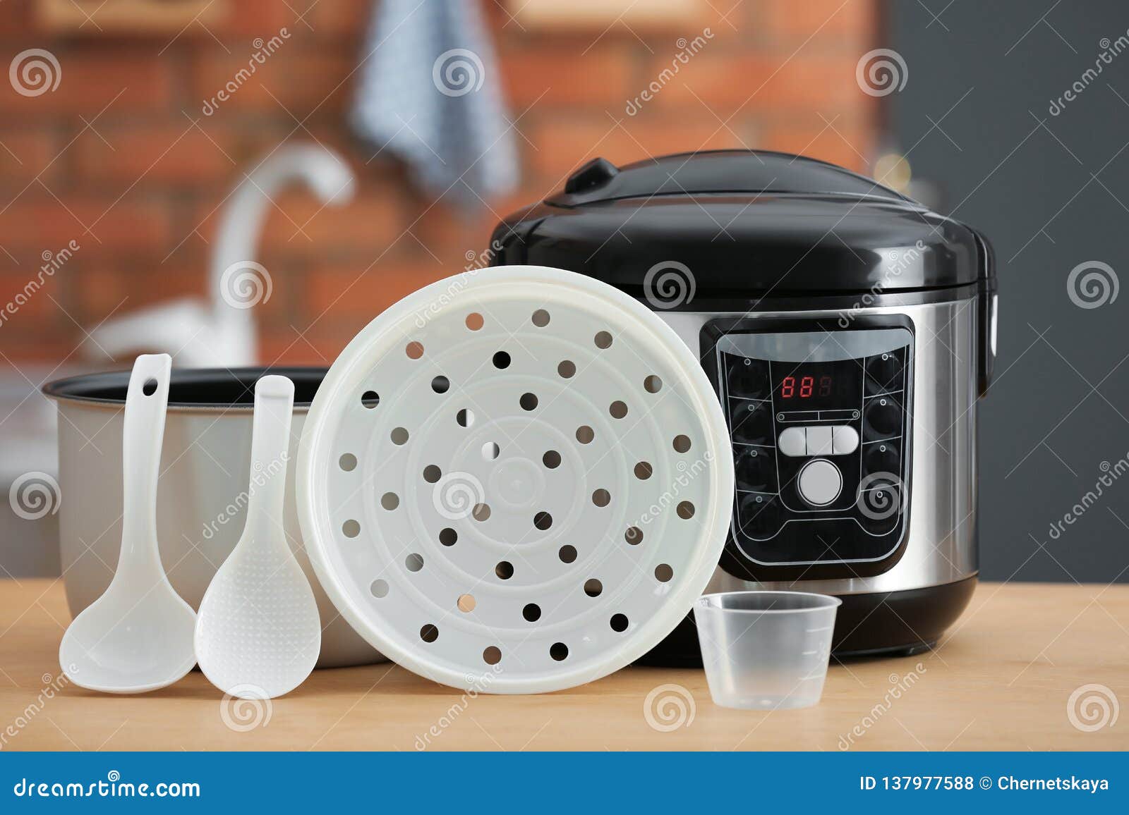 Modern Electric Multi Cooker, Parts and Accessories on Table Stock ...