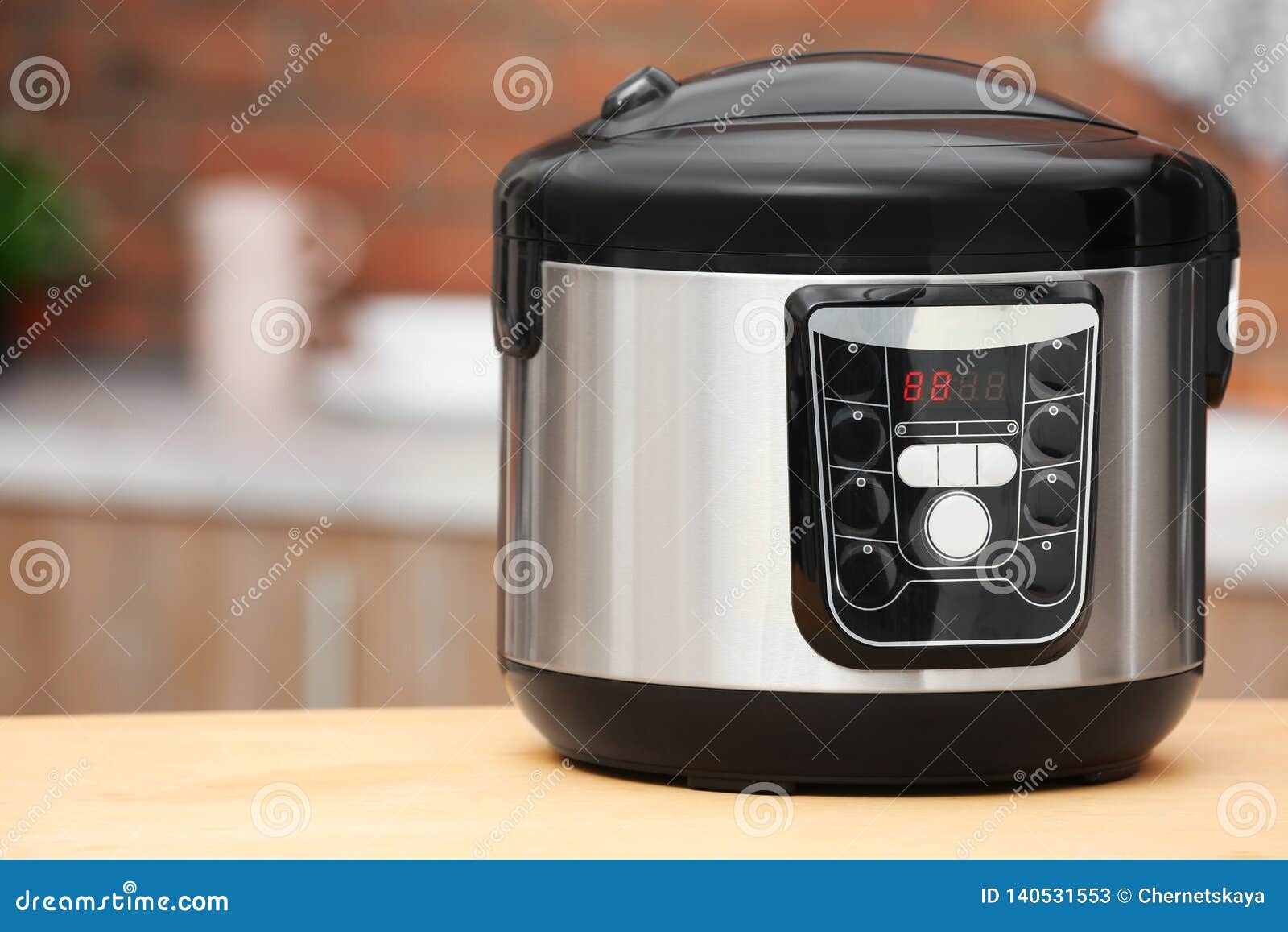 Modern Electric Multi Cooker on Table in Kitchen. Stock Image - Image ...