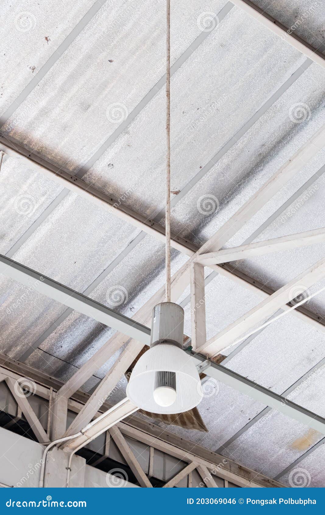 Modern Electrical Lamp is Hanging on the Steel Beam. Stock Photo ...