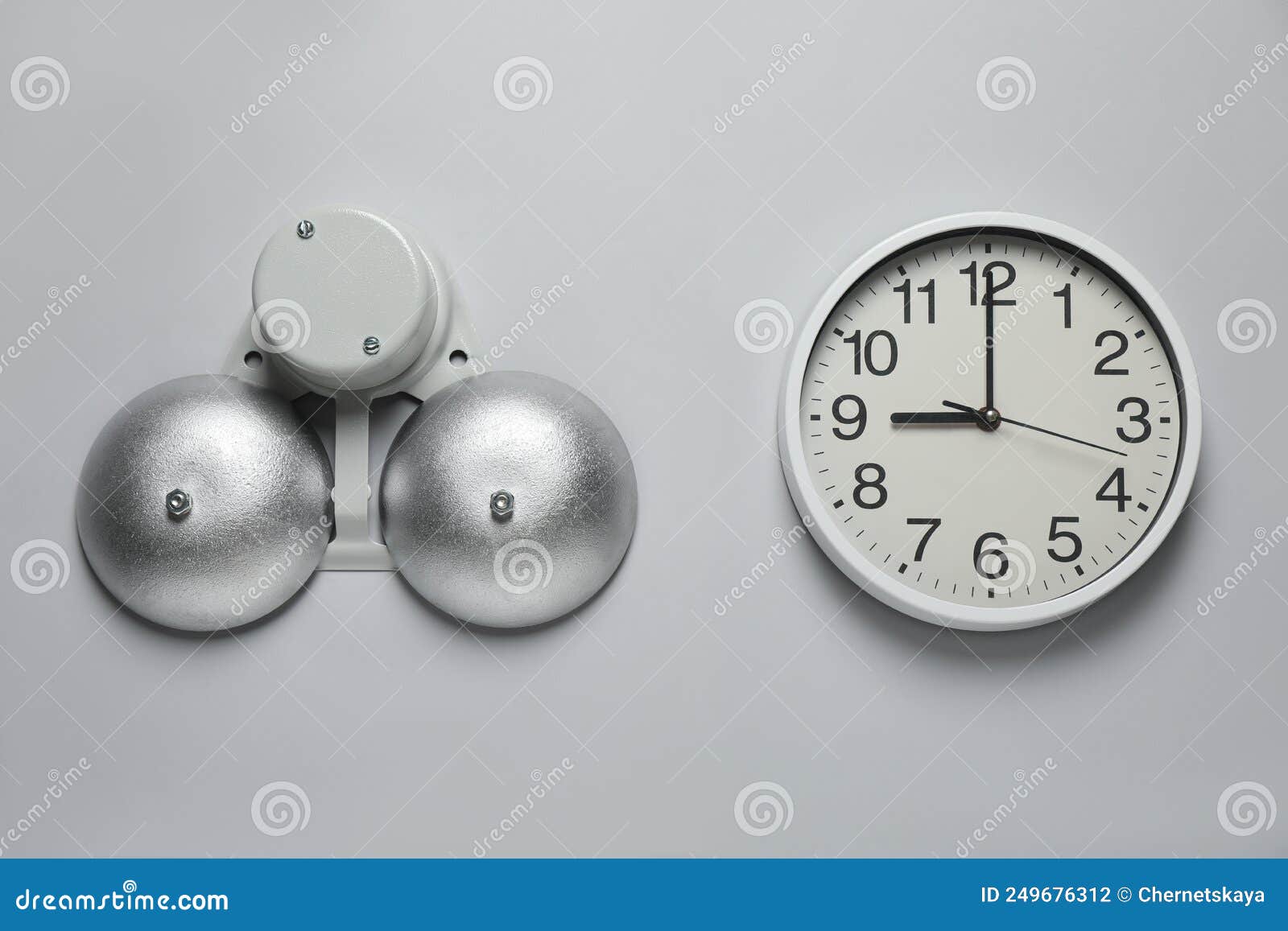 Modern Electrical School Bell and Clock on White Wall Stock Photo ...