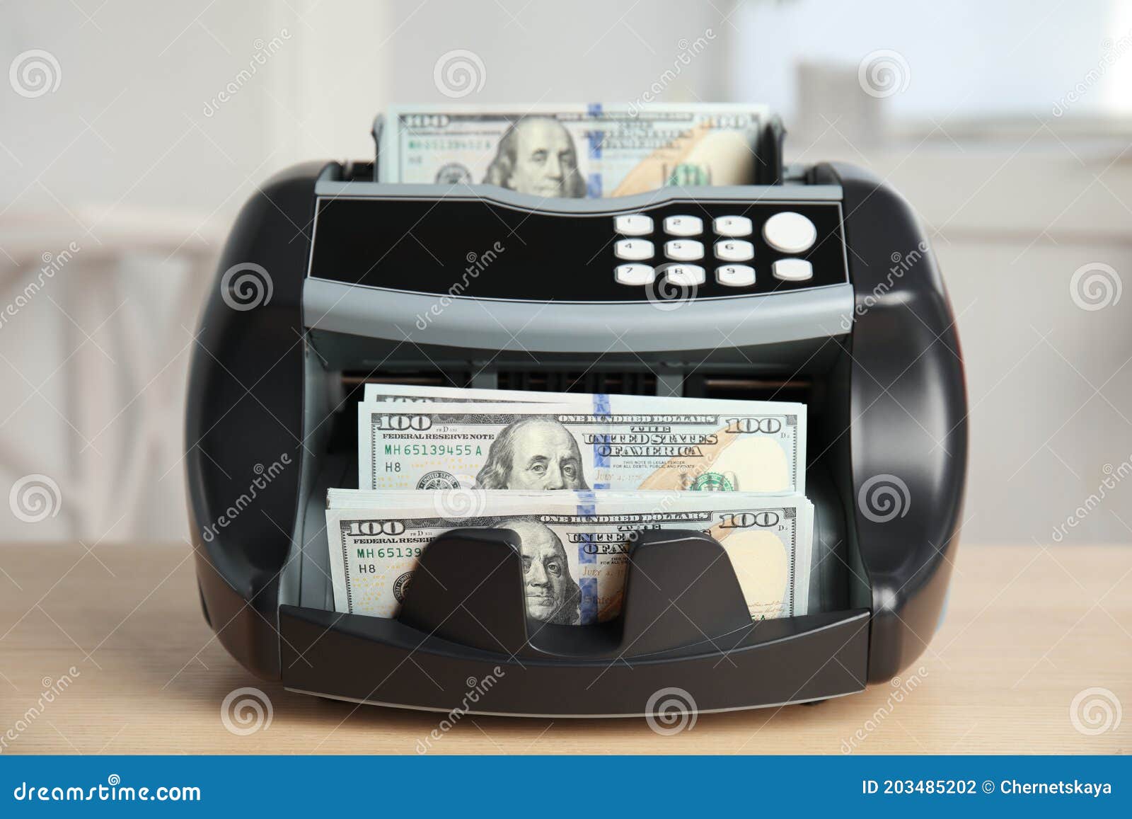Modern Electronic Bill Counter with Money on Table Indoors Stock Photo ...