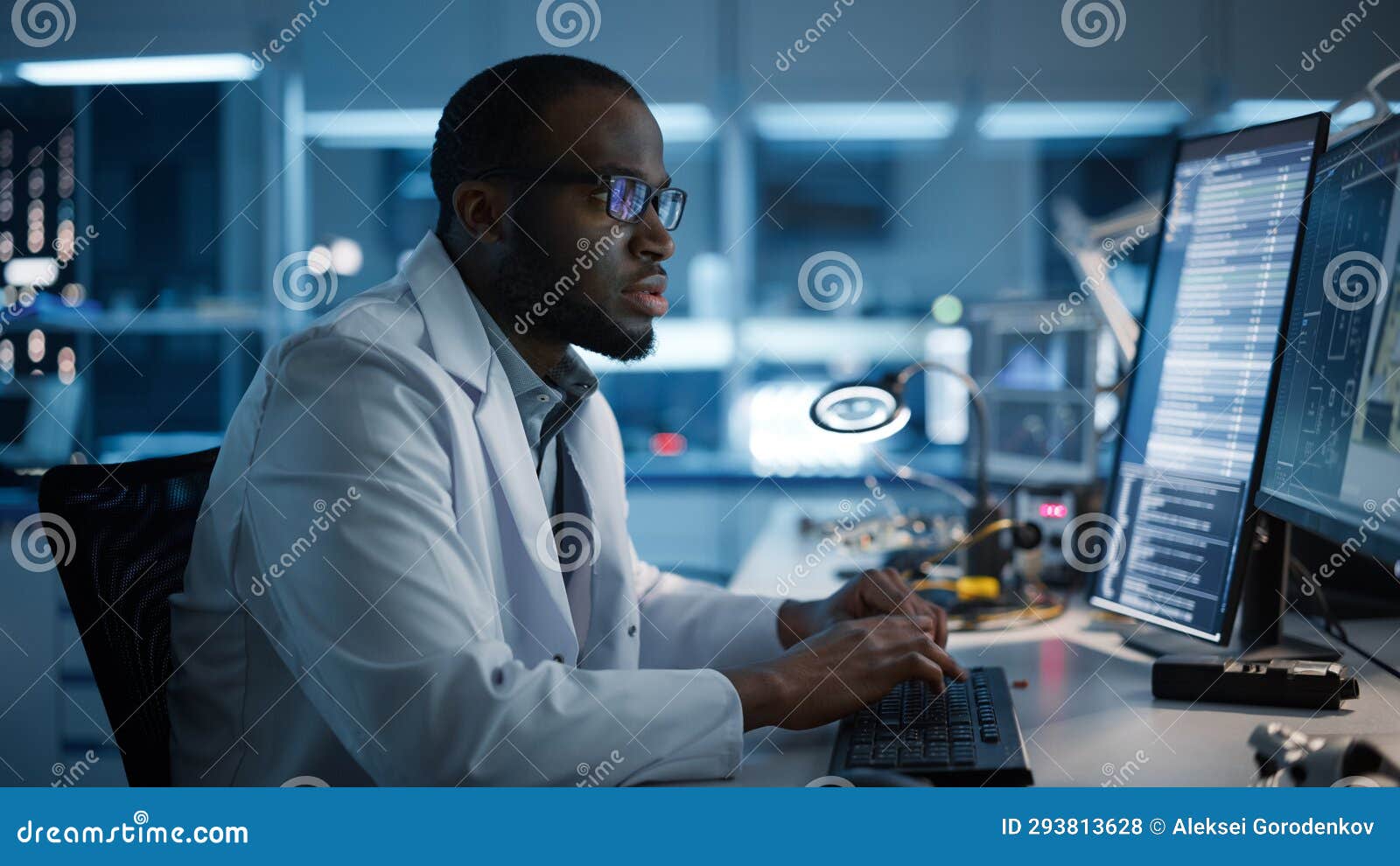 Modern Electronics Development Facility: Male Engineer Works on ...