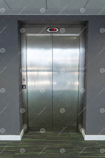 Modern Elevator with Closed Doors in an Office Building. Stock Image ...