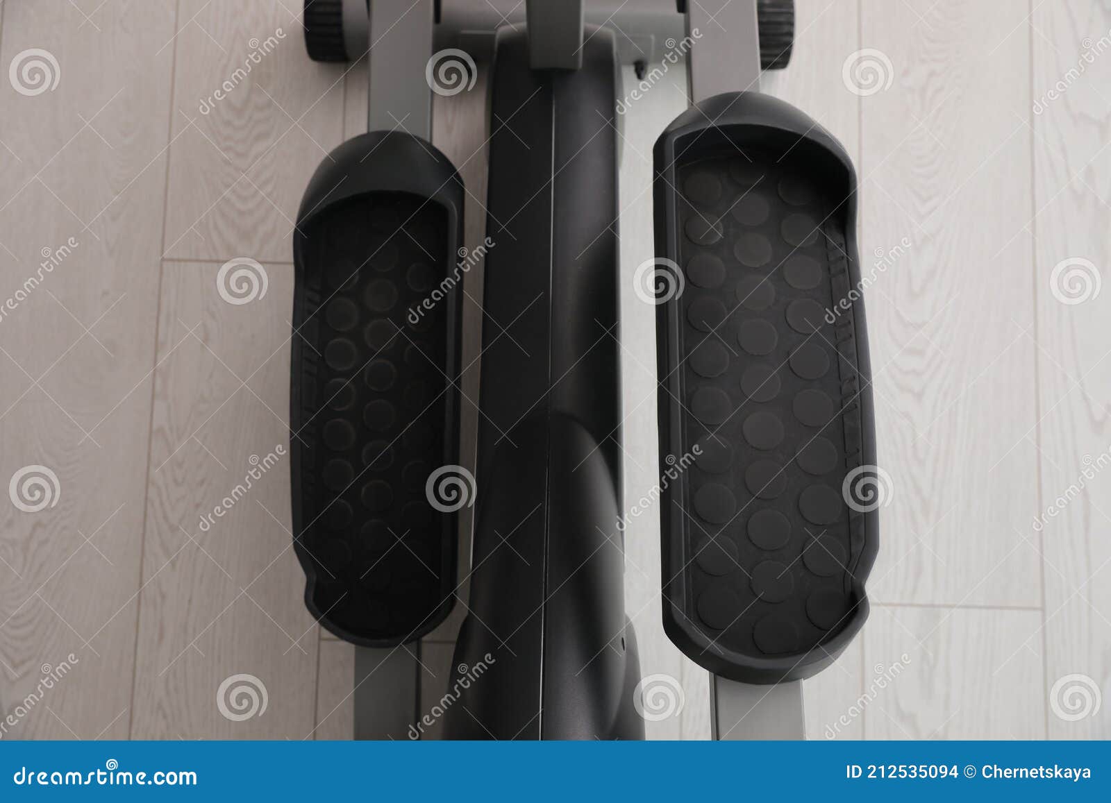 Modern Elliptical Machine Cross Trainer on Floor, Top View Stock Photo ...